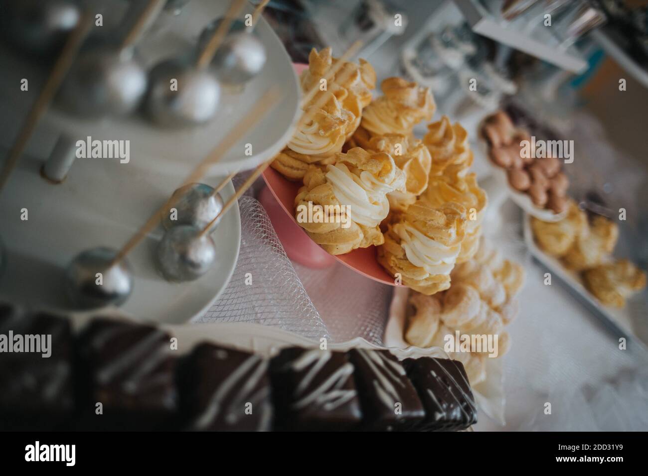 A selective focus closeup of cookies with icing and other sweet treats ...