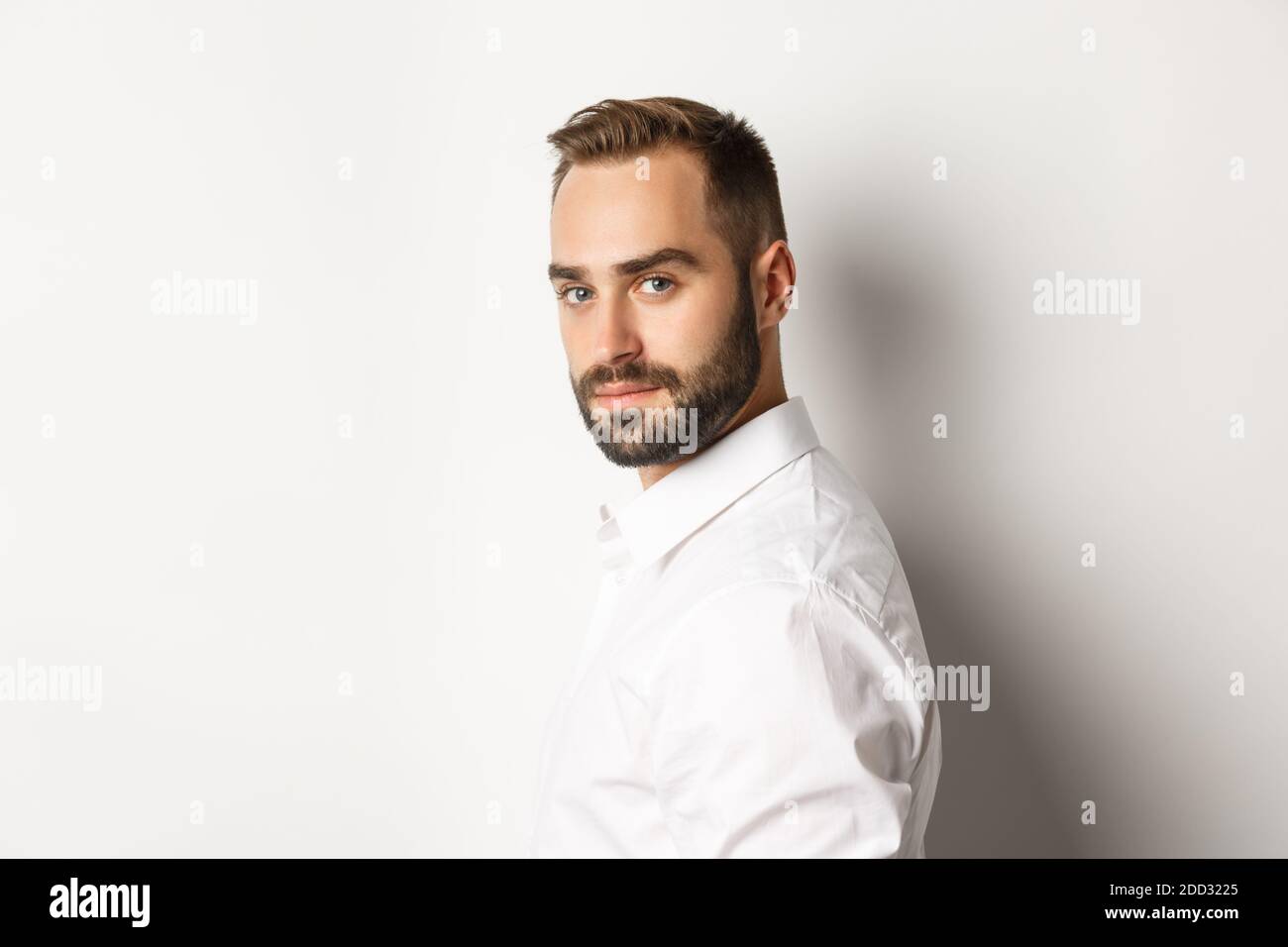 Close-up of professional business man turn face at camera, looking ...