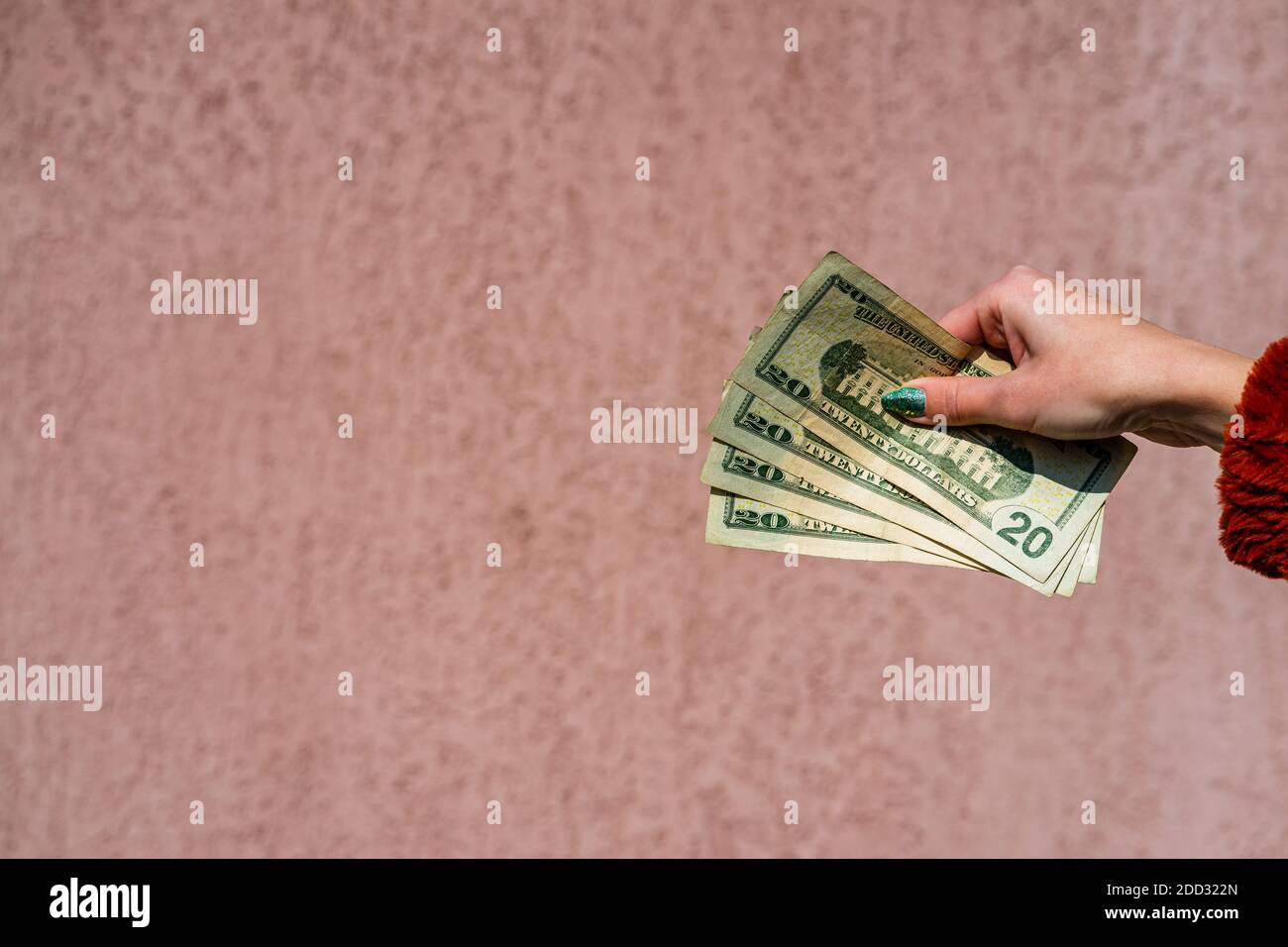 Hand holding showing dollars money and giving or receiving money like ...