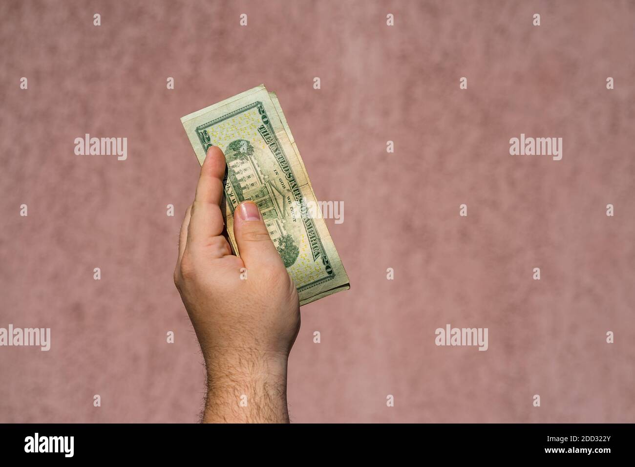 Hand holding showing dollars money and giving or receiving money like ...