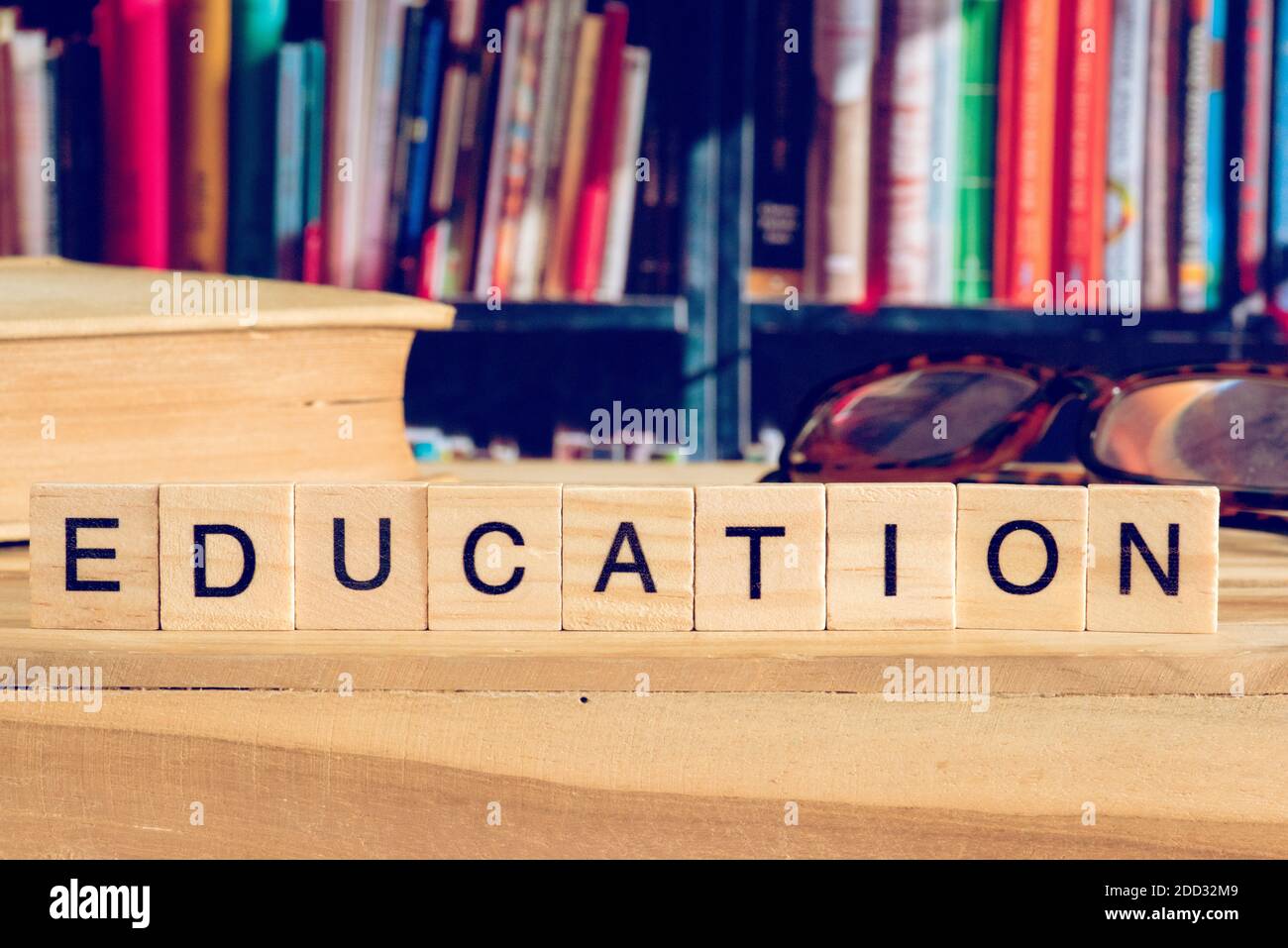 Education and a book in a library Stock Photo - Alamy