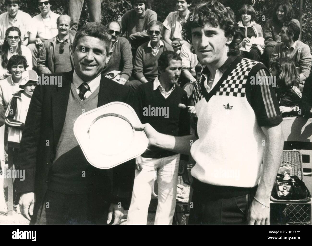 Romenian tennis player and coach Florin Segarceanu receives a prize ...