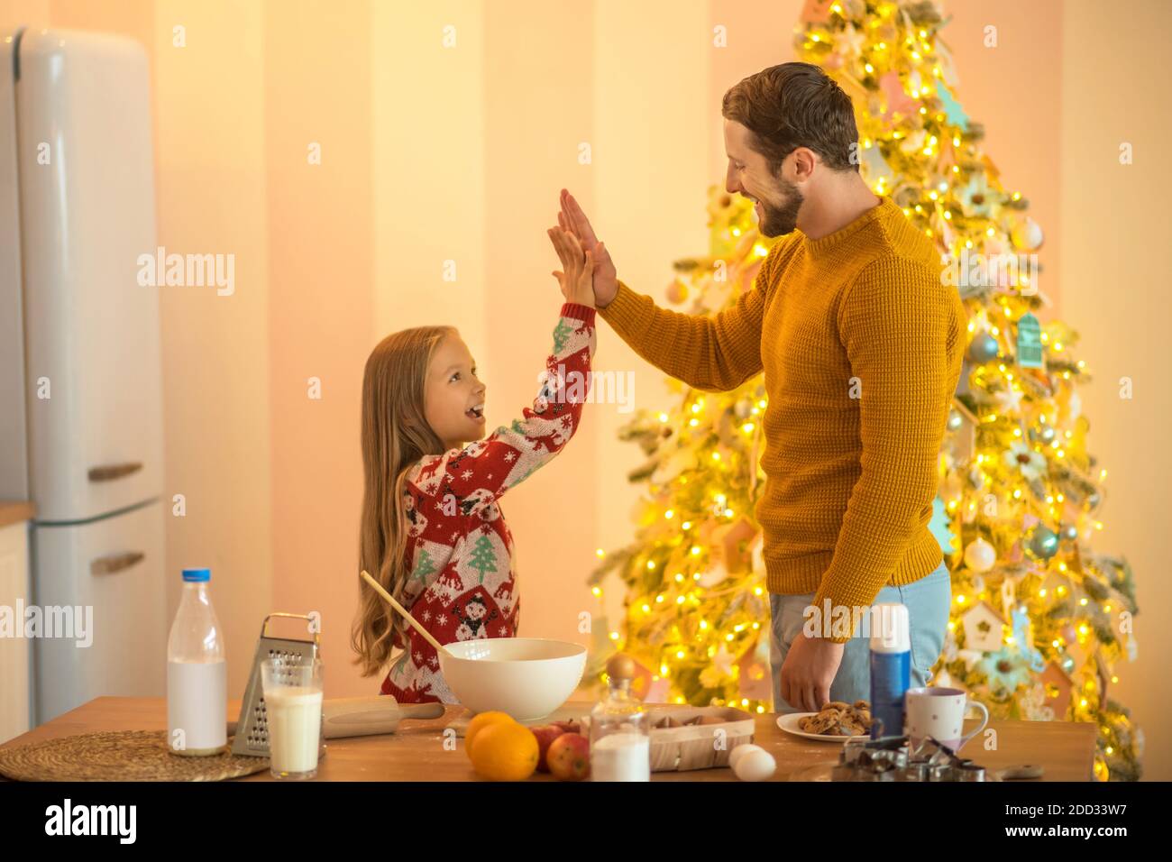 Girl and her dad feeling good and doing high five Stock Photo - Alamy