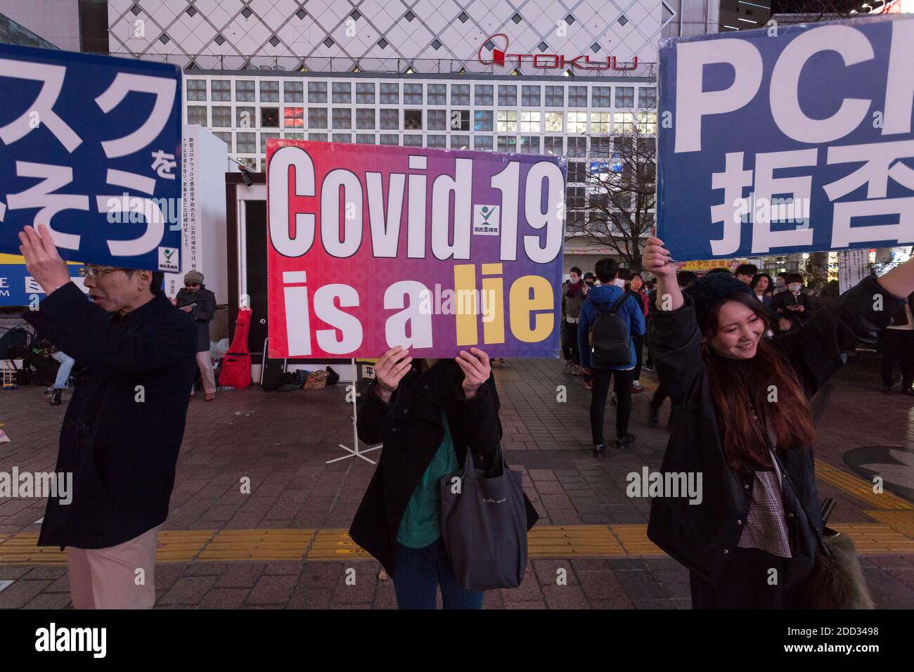 Anti-mask protesters in front of Shibuya Station, Tokyo, Japan ...