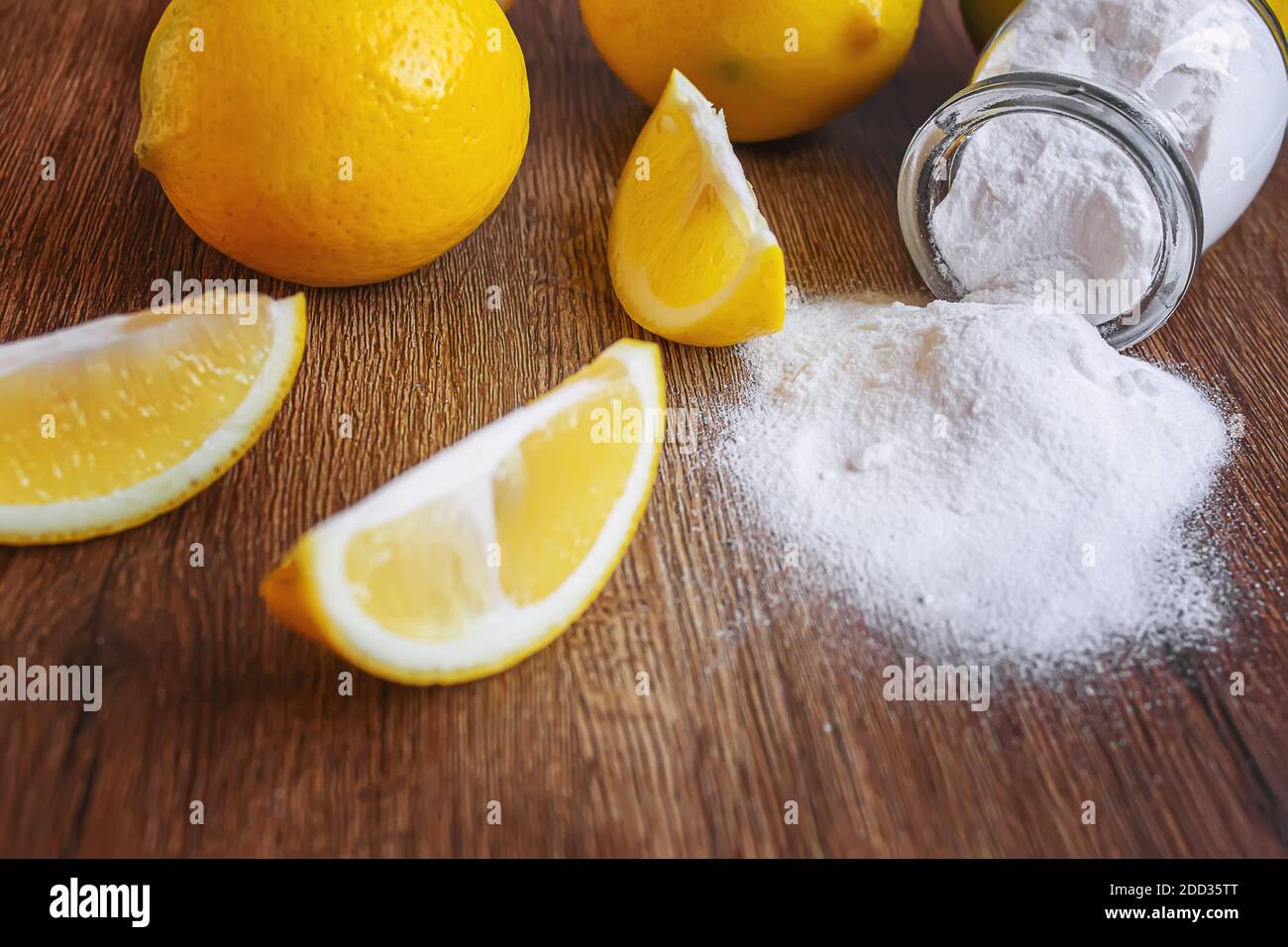 Citric acid on a wooden background with lemon. Selective focus.food ...