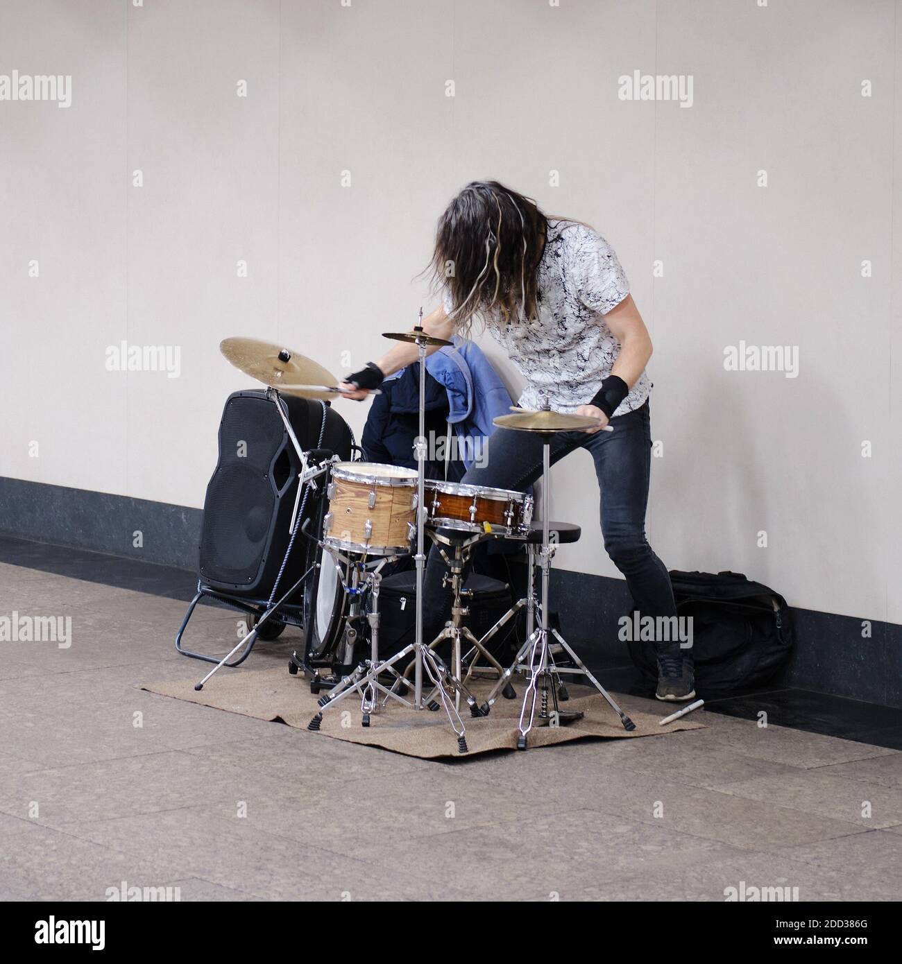 Street musician drummer playing in underground subway Stock Photo - Alamy