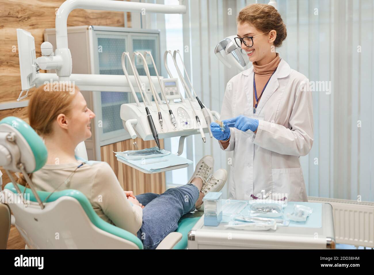 Dentist preparing instruments procedure hi-res stock photography and ...