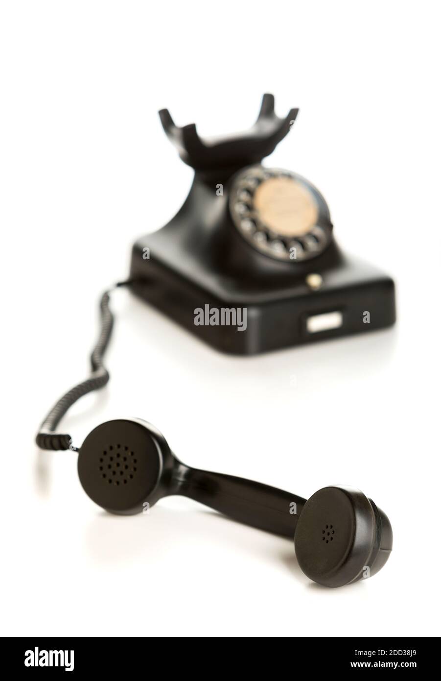 Vintage telephone with receiver taken off in focus, isolated on white ...