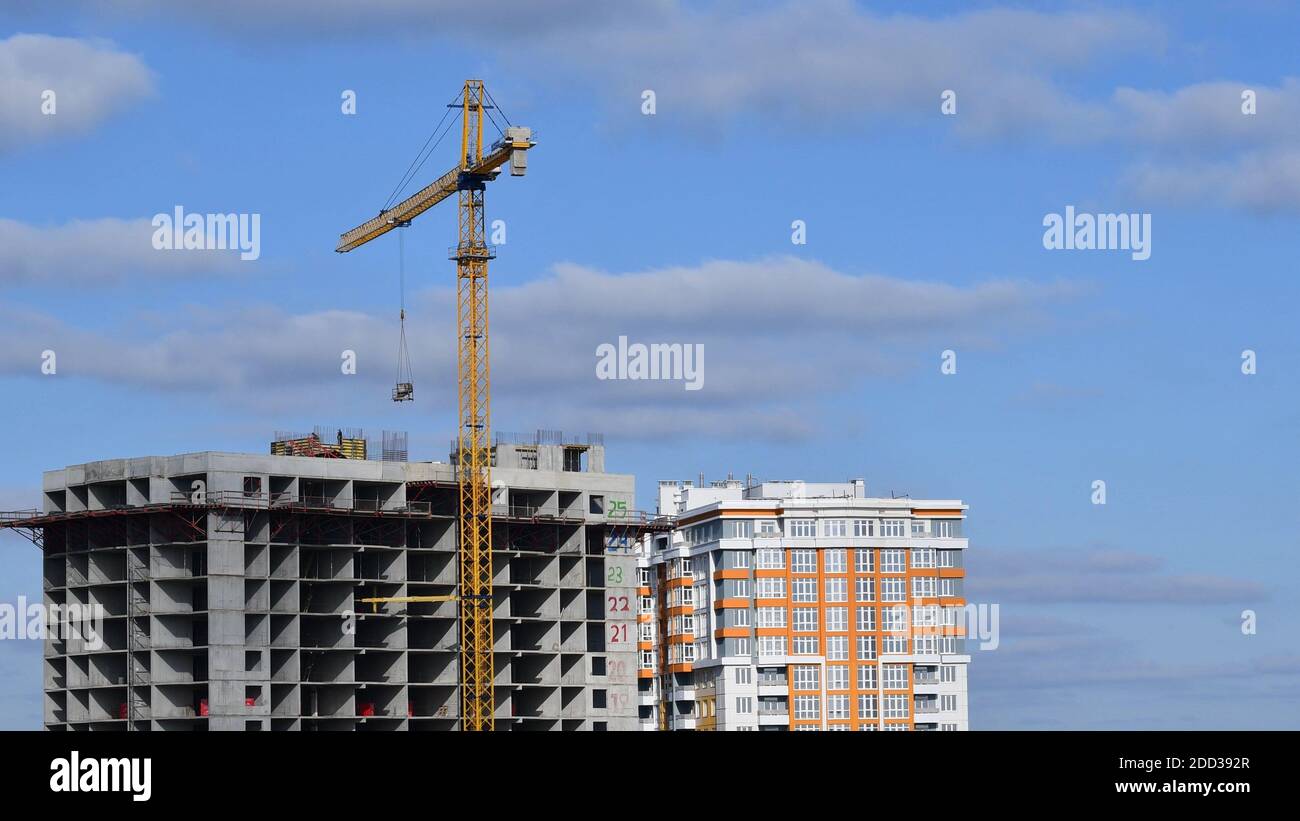 Construction site at rooftop of unfinished skyscraper with big tower ...