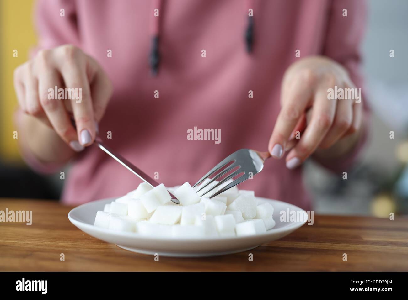 Woman eating sugar cube hi-res stock photography and images - Alamy