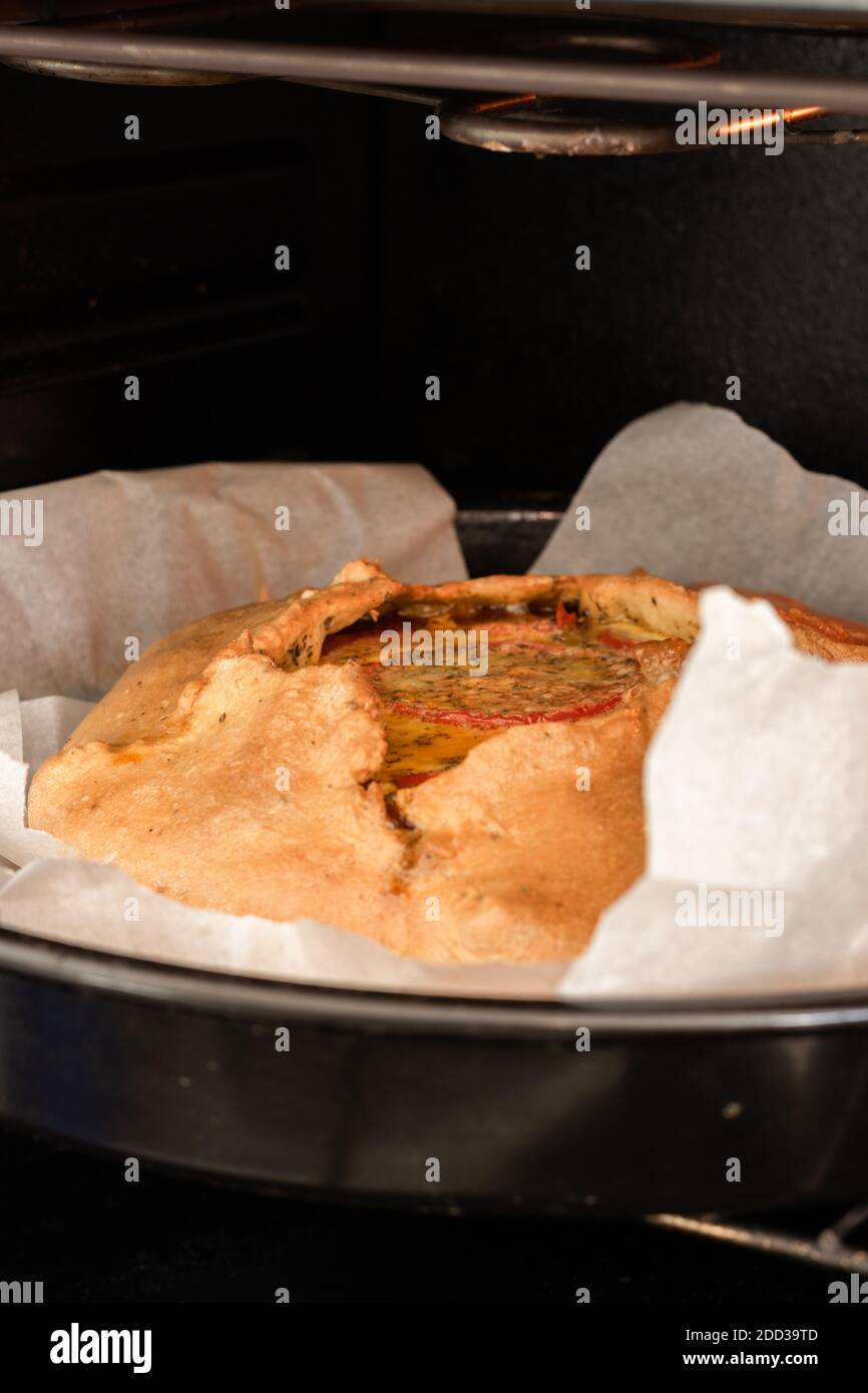 Ready to eat salt pie with vegetables, traditional homemade meal Stock ...