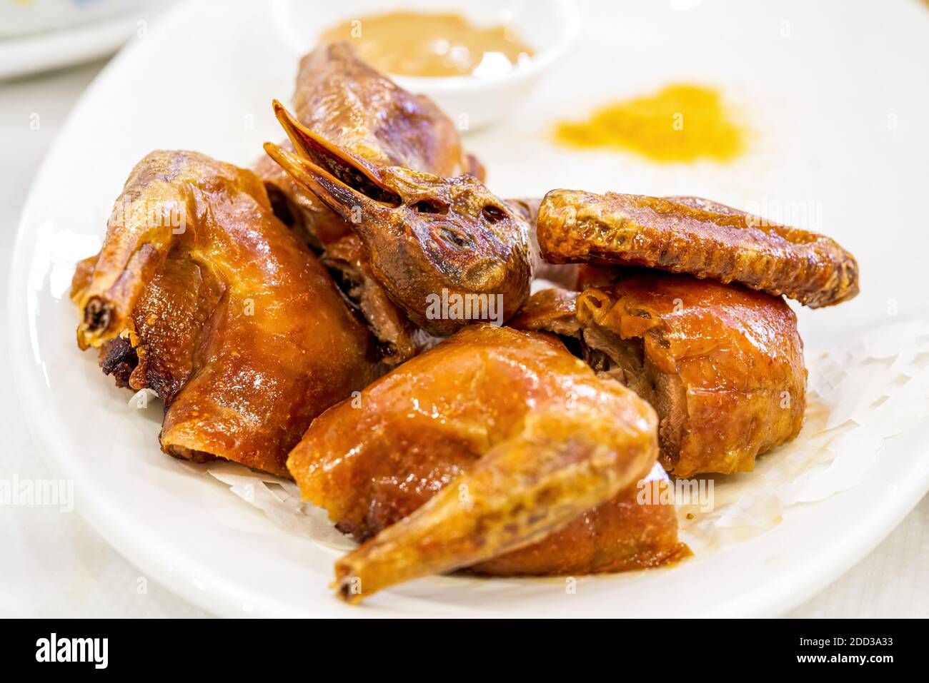 A classic Cantonese dish, braised pigeon, fried pigeon Stock Photo - Alamy