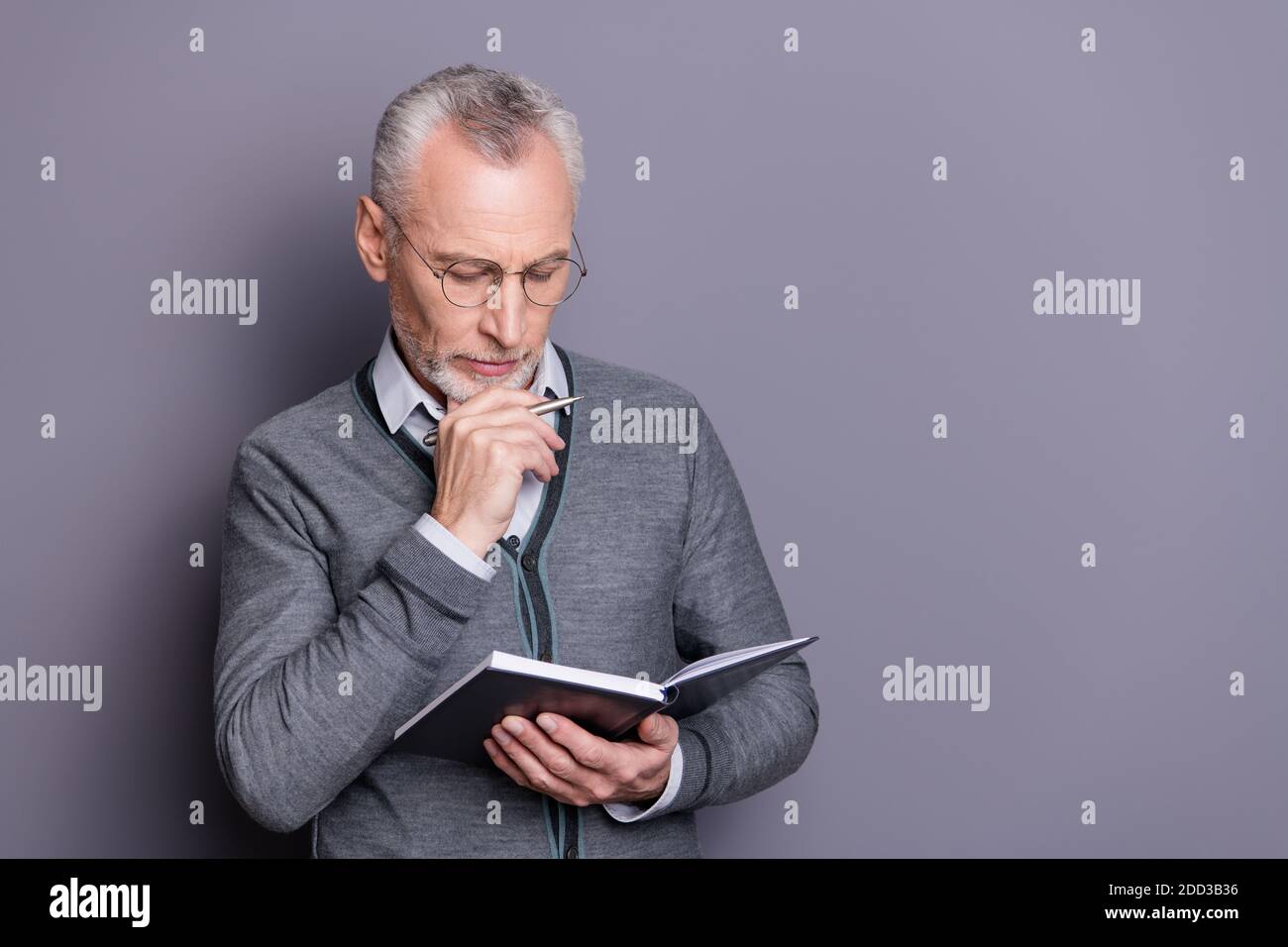 Portrait of his he nice-looking attractive calm focused intellectual ...