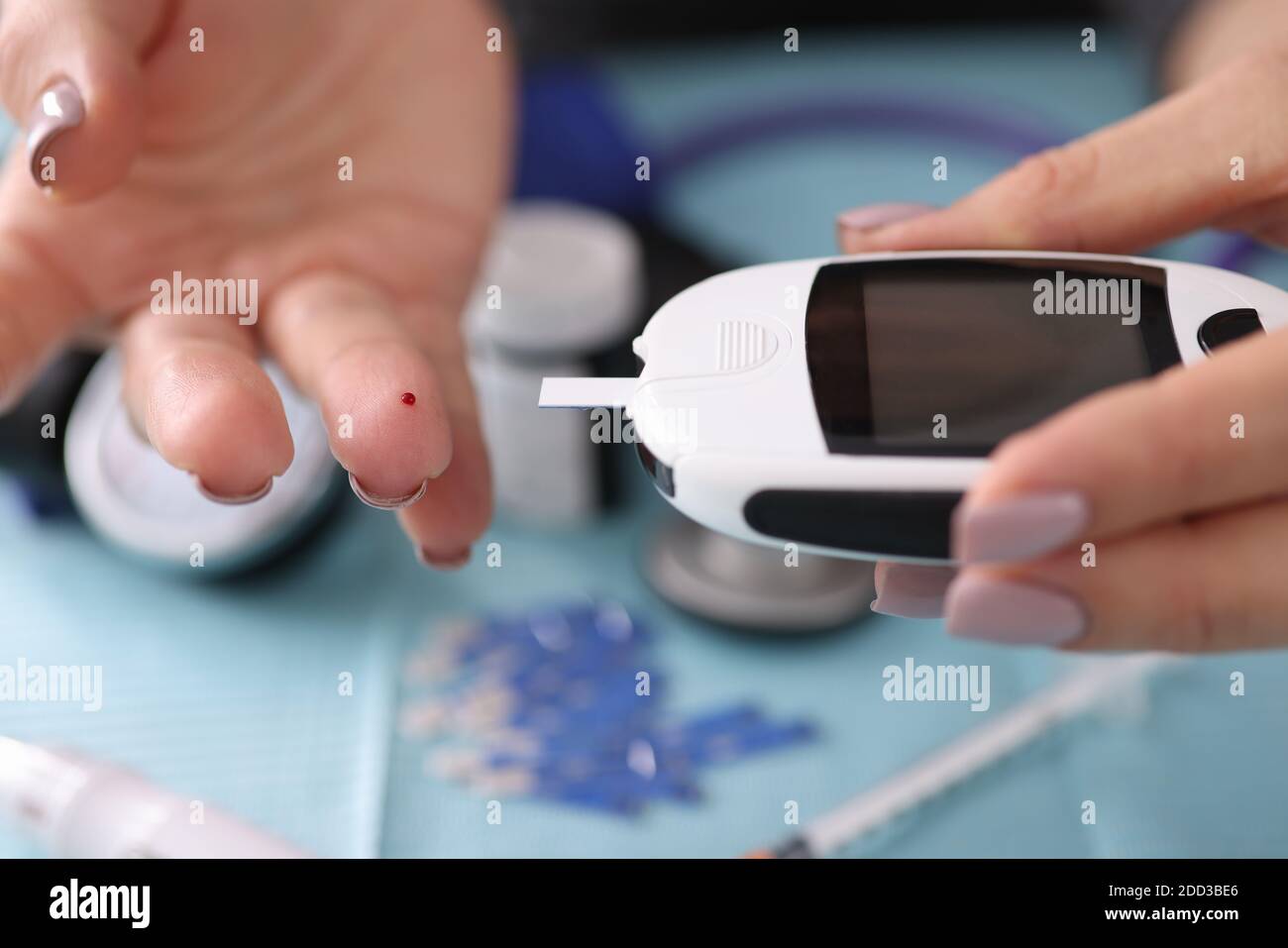 Blood glucometer hi-res stock photography and images - Alamy
