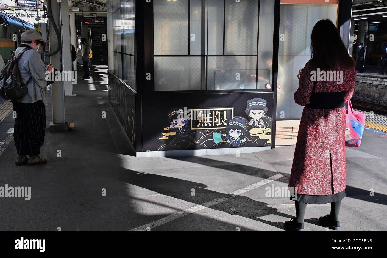 Peoples take photo during a collaborate event for animation film "Demon ...