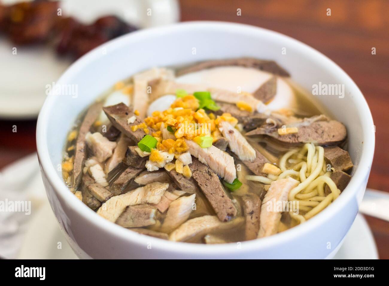 Filipino noodle soup called batchoy at a local restaurant in Bicol ...