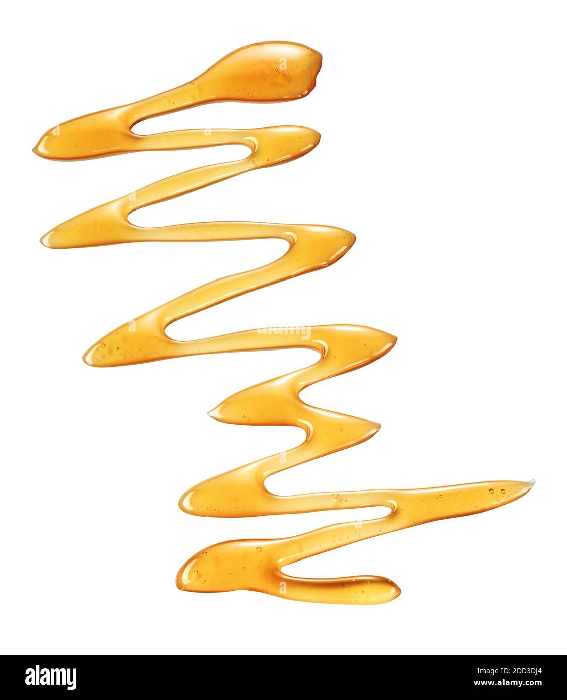 Decorative zigzag line of golden honey drizzled on white in vertical ...