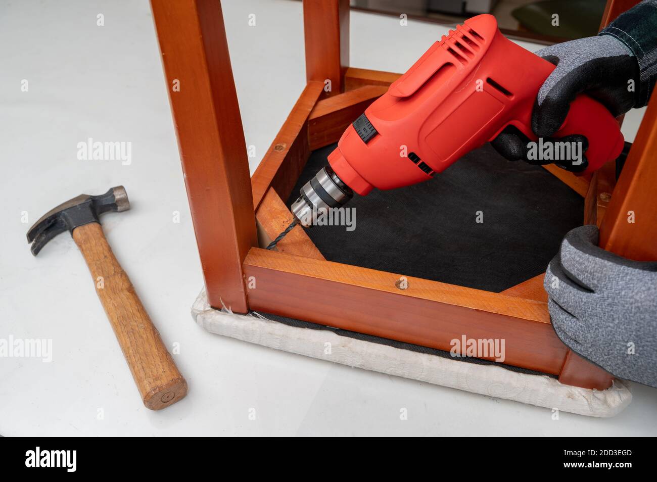 Hand repairing hi-res stock photography and images - Alamy