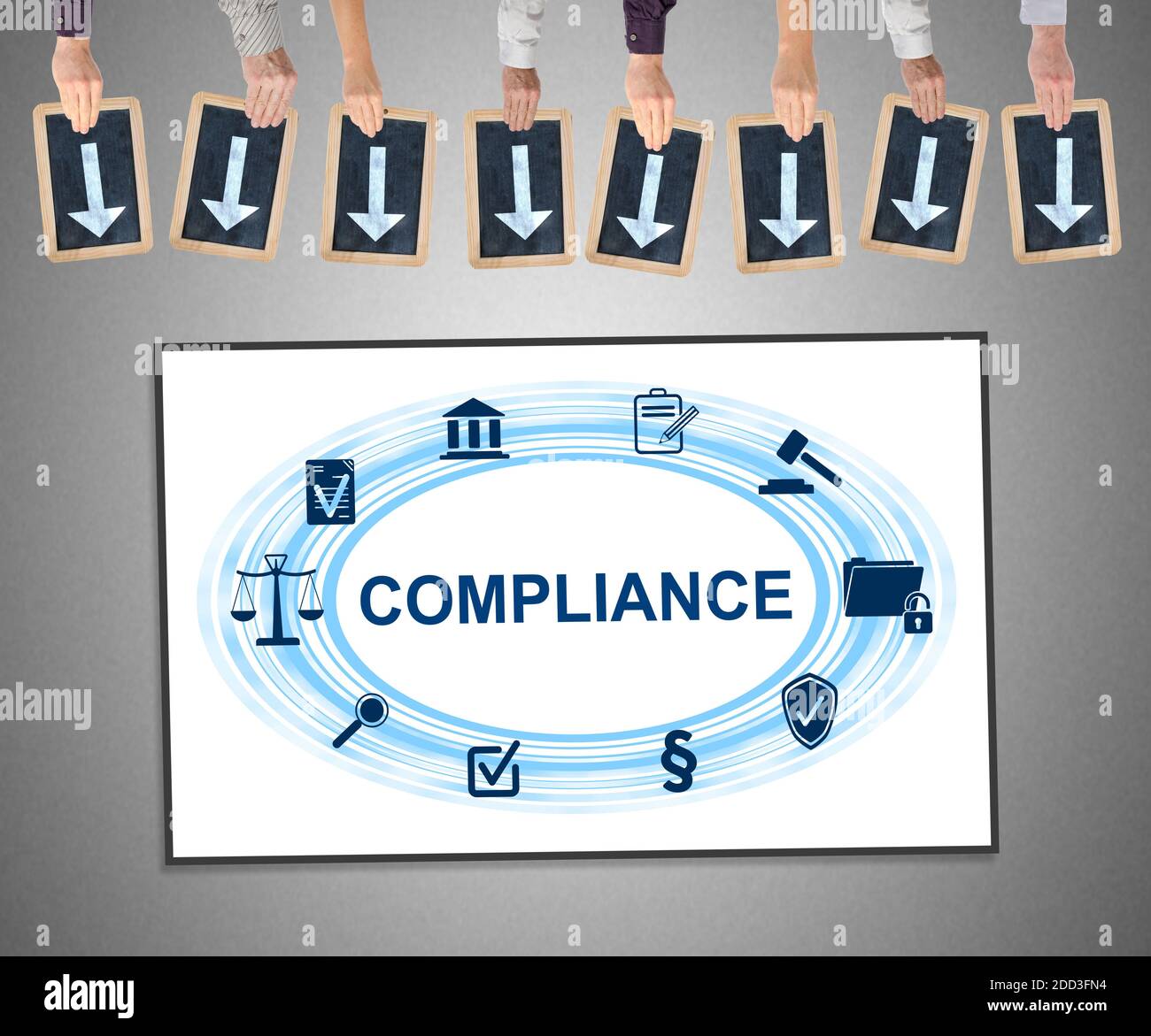 Hands holding writing slates with arrows pointing on compliance concept ...