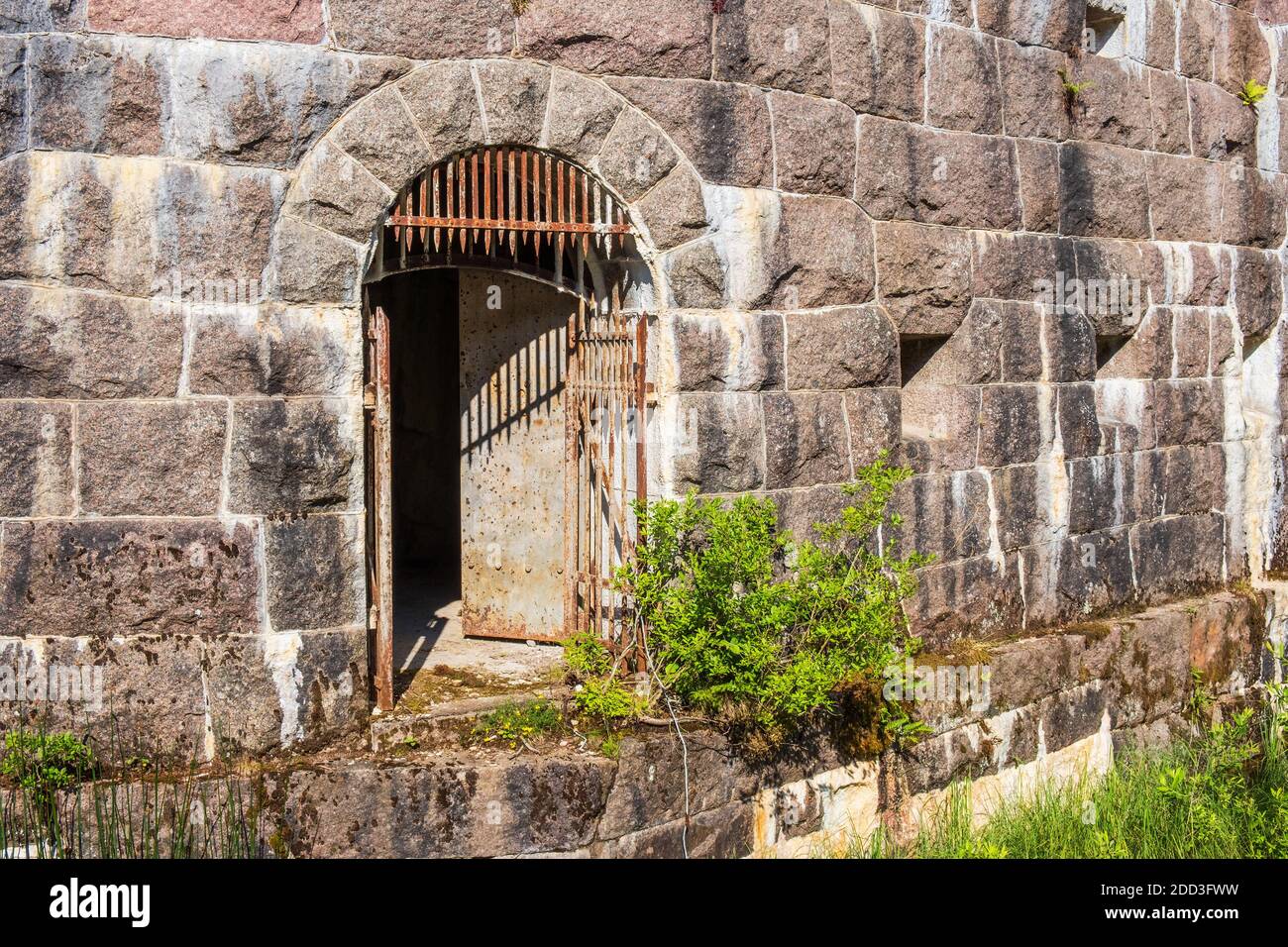 Old rusty Iron gate in a fortified wall Stock Photo - Alamy