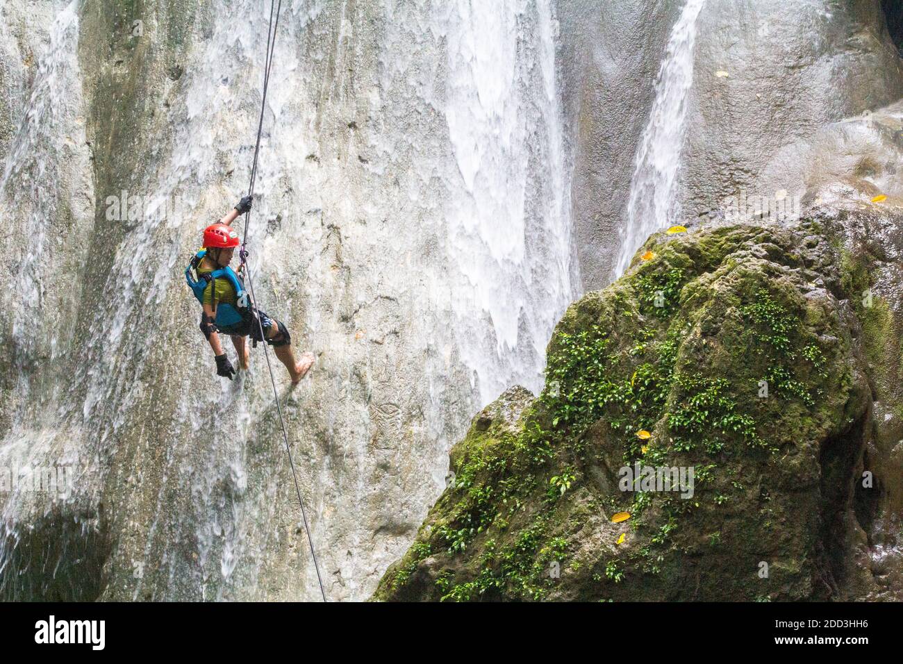 Filipino waterfall rapelling in Bicol, Philippines Stock Photo - Alamy