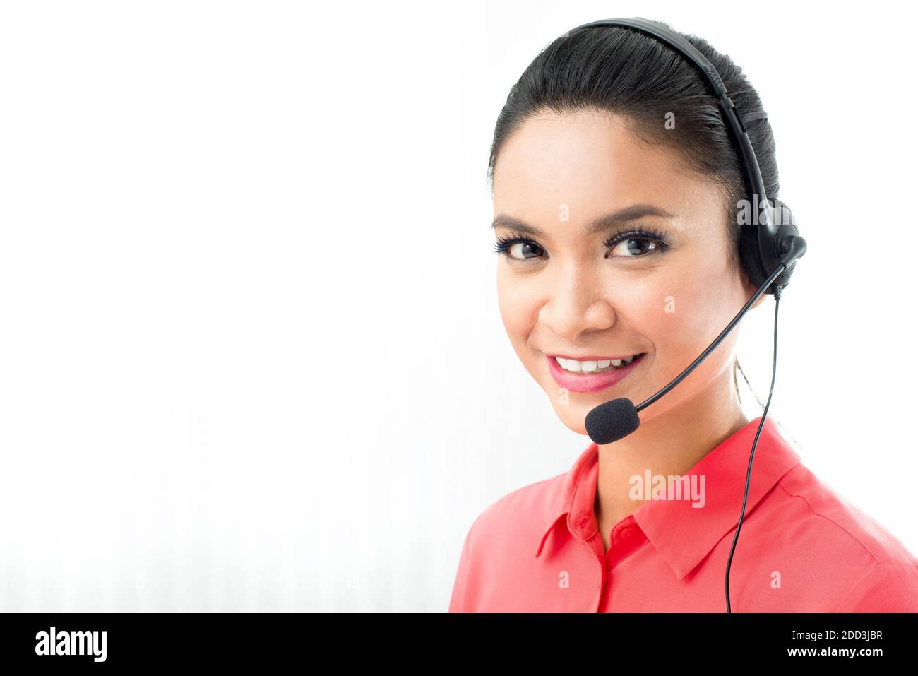 Woman wearing microphone headset as an operator or call center staff ...
