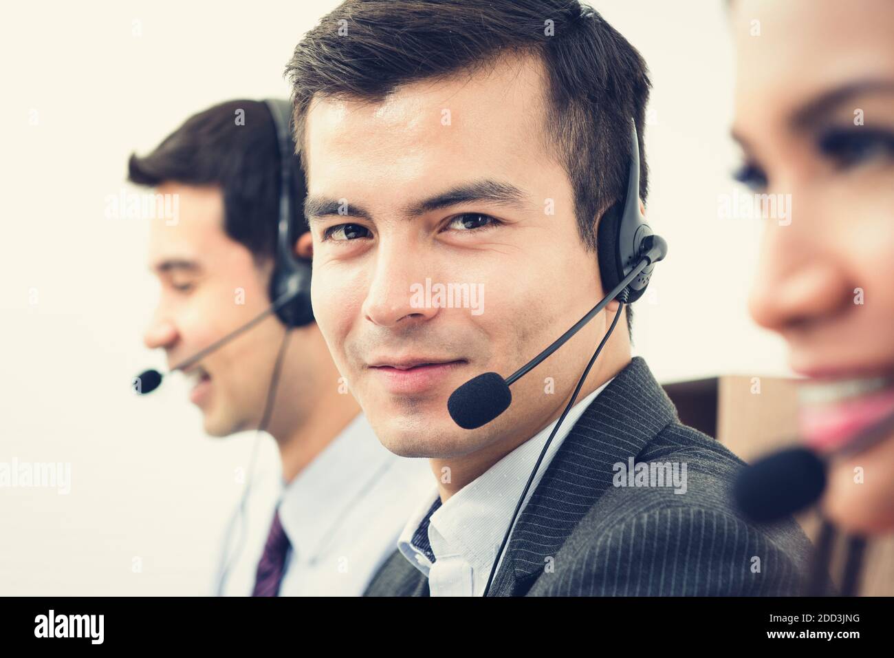 Call center (or telemarketer) team, vintage tone effect Stock Photo - Alamy
