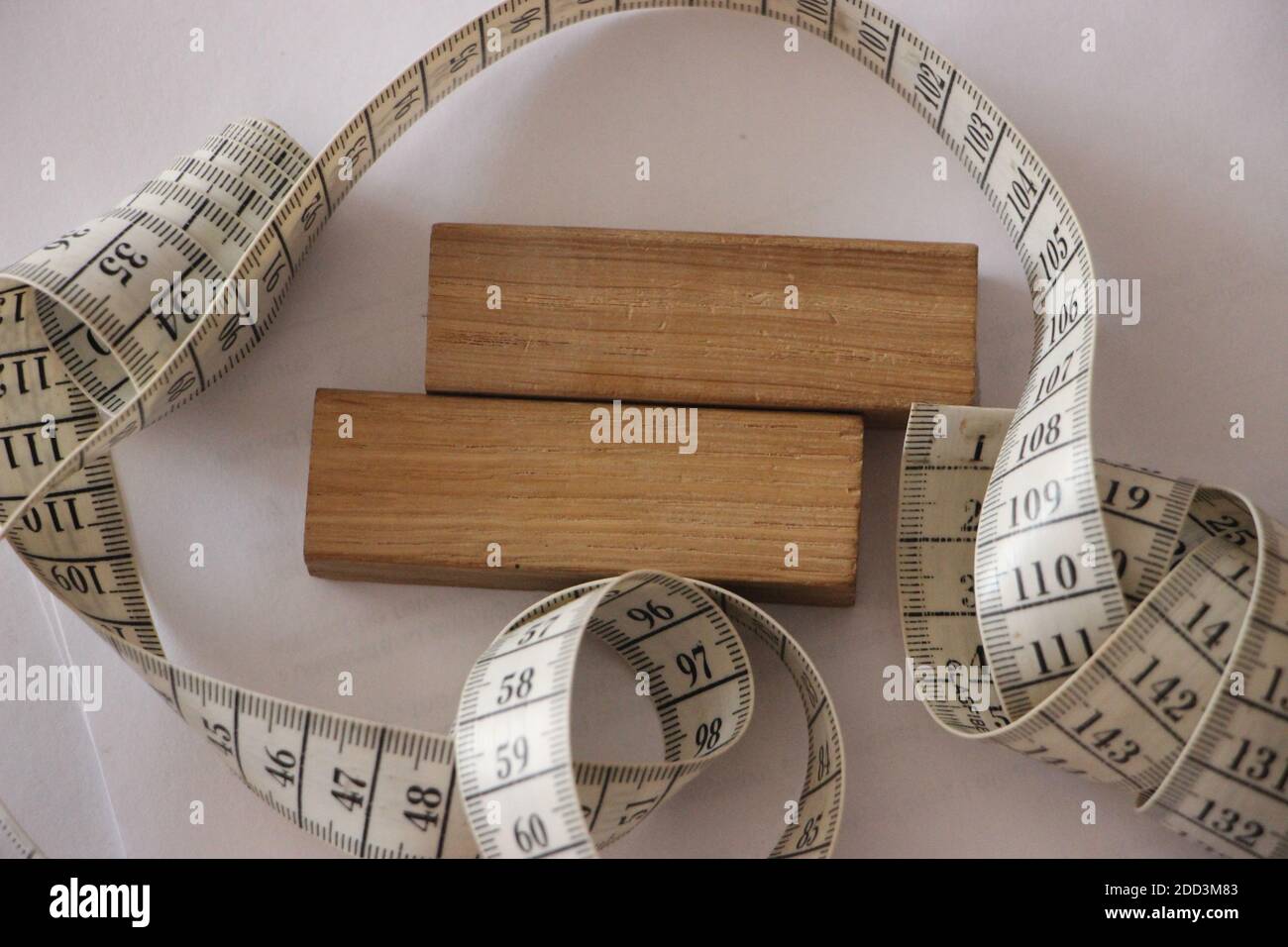 measuring tape and wooden blocks. Healthcare concept Stock Photo - Alamy