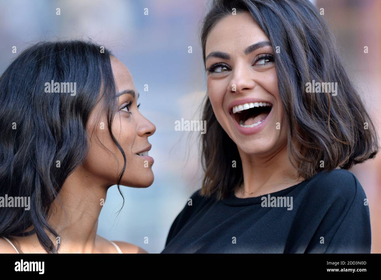 Mila Kunis Attends The Ceremony Honoring Zoe Saldana With A Star On The Hollywood Walk Of Fame