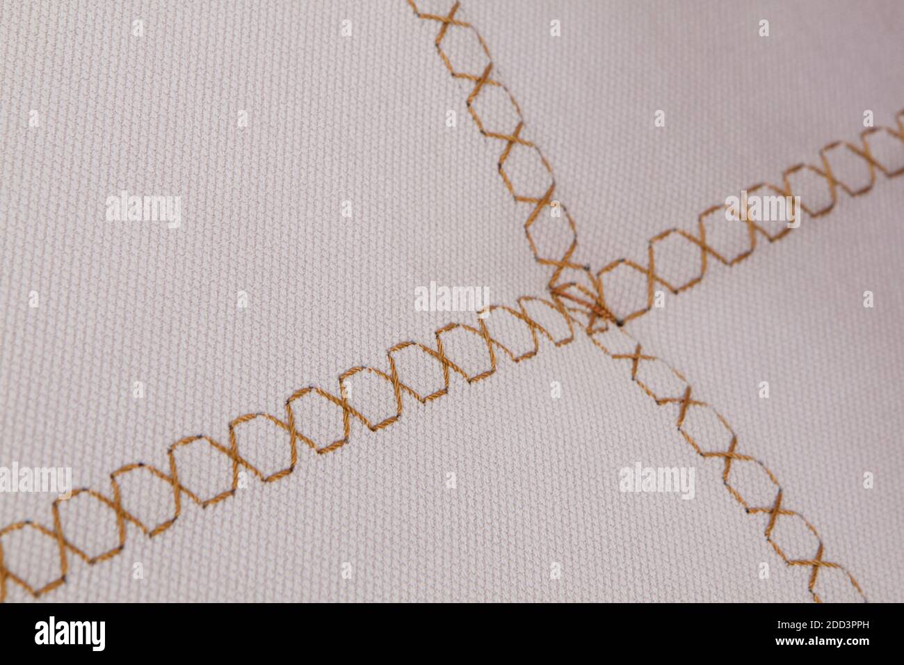 Machine stitch on leather fabric close up macro Stock Photo - Alamy