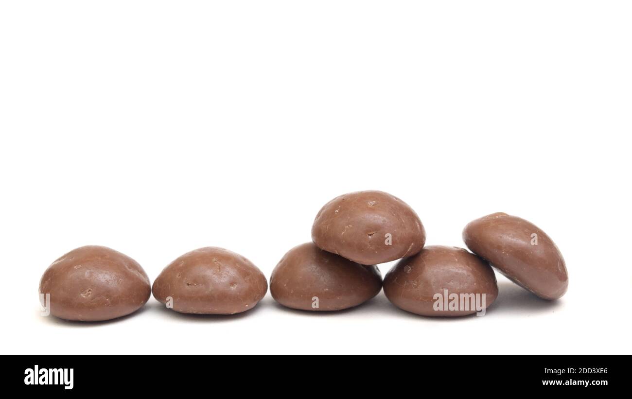 Side view of traditional Dutch Candy Brown Chocolate Pepernoten on a ...