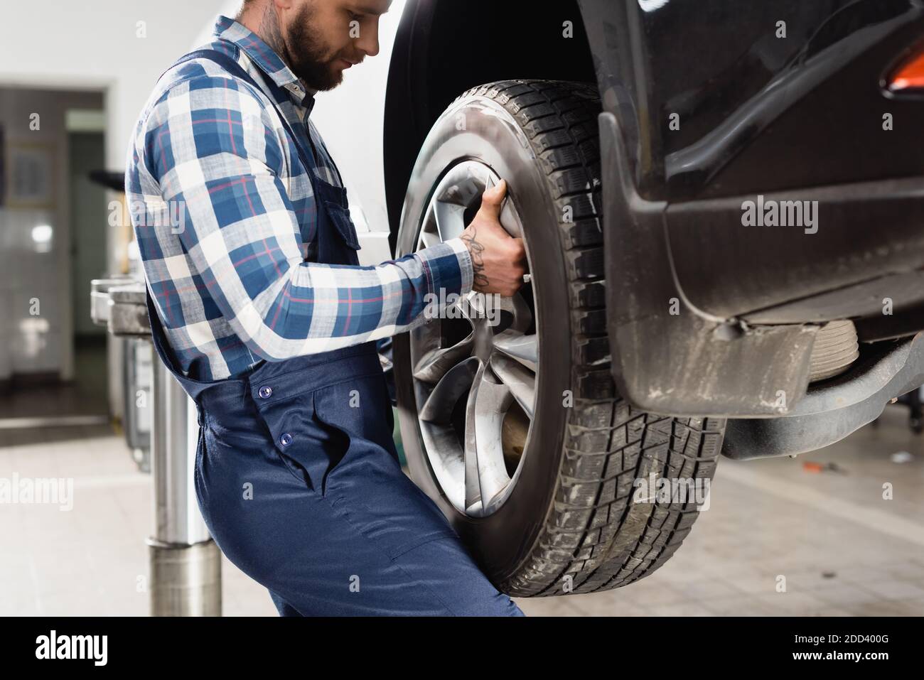 Partial view mechanic fixing hi-res stock photography and images - Alamy