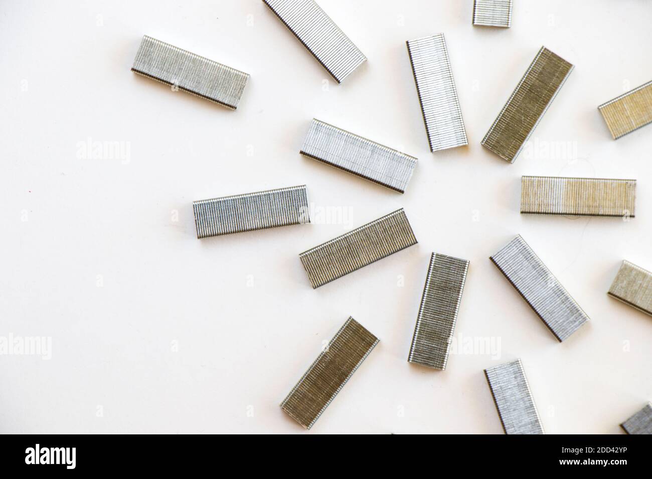Paper staples pile on the white background, circle form Stock Photo - Alamy
