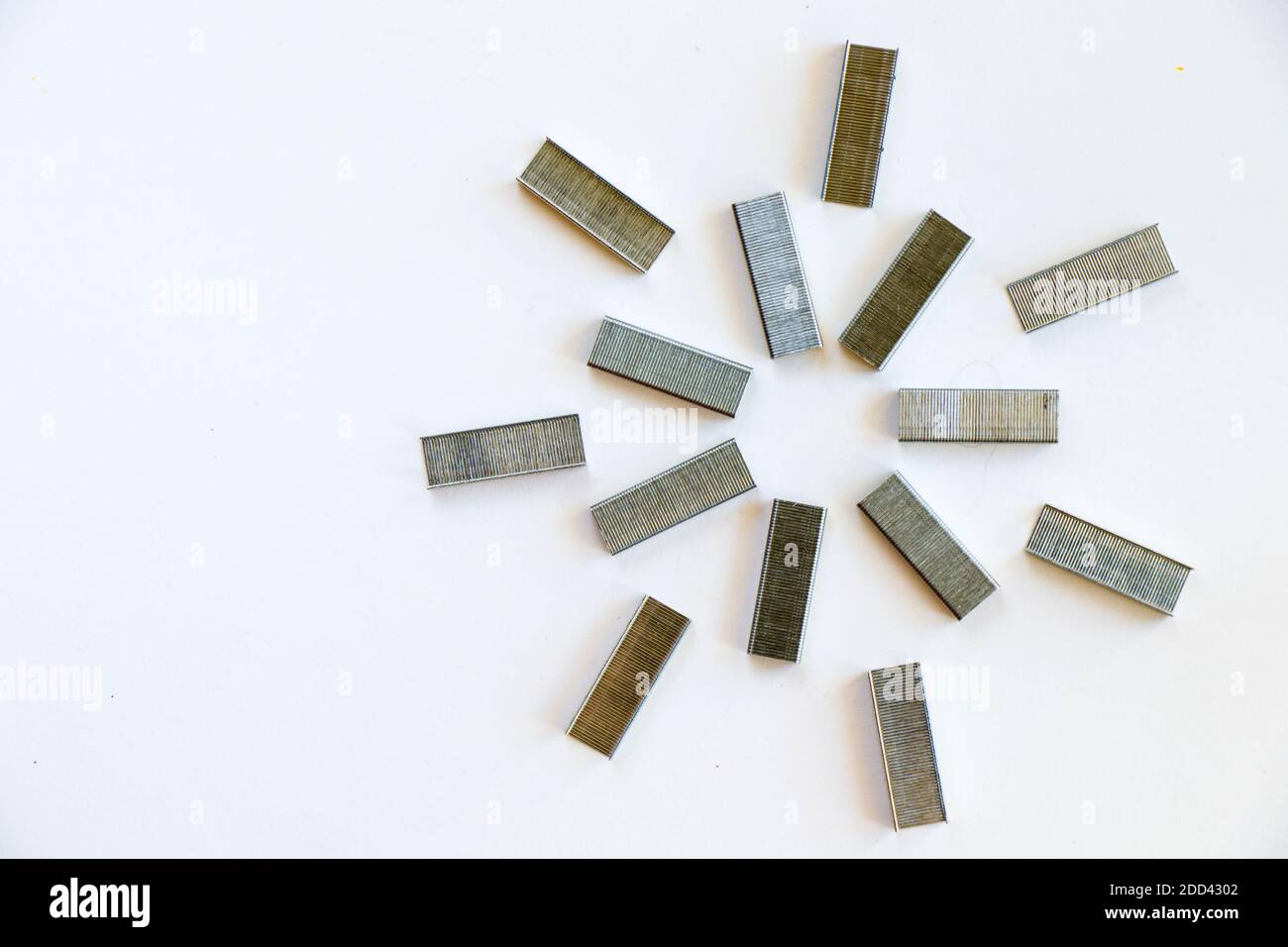 Paper staples pile on the white background, circle form Stock Photo - Alamy