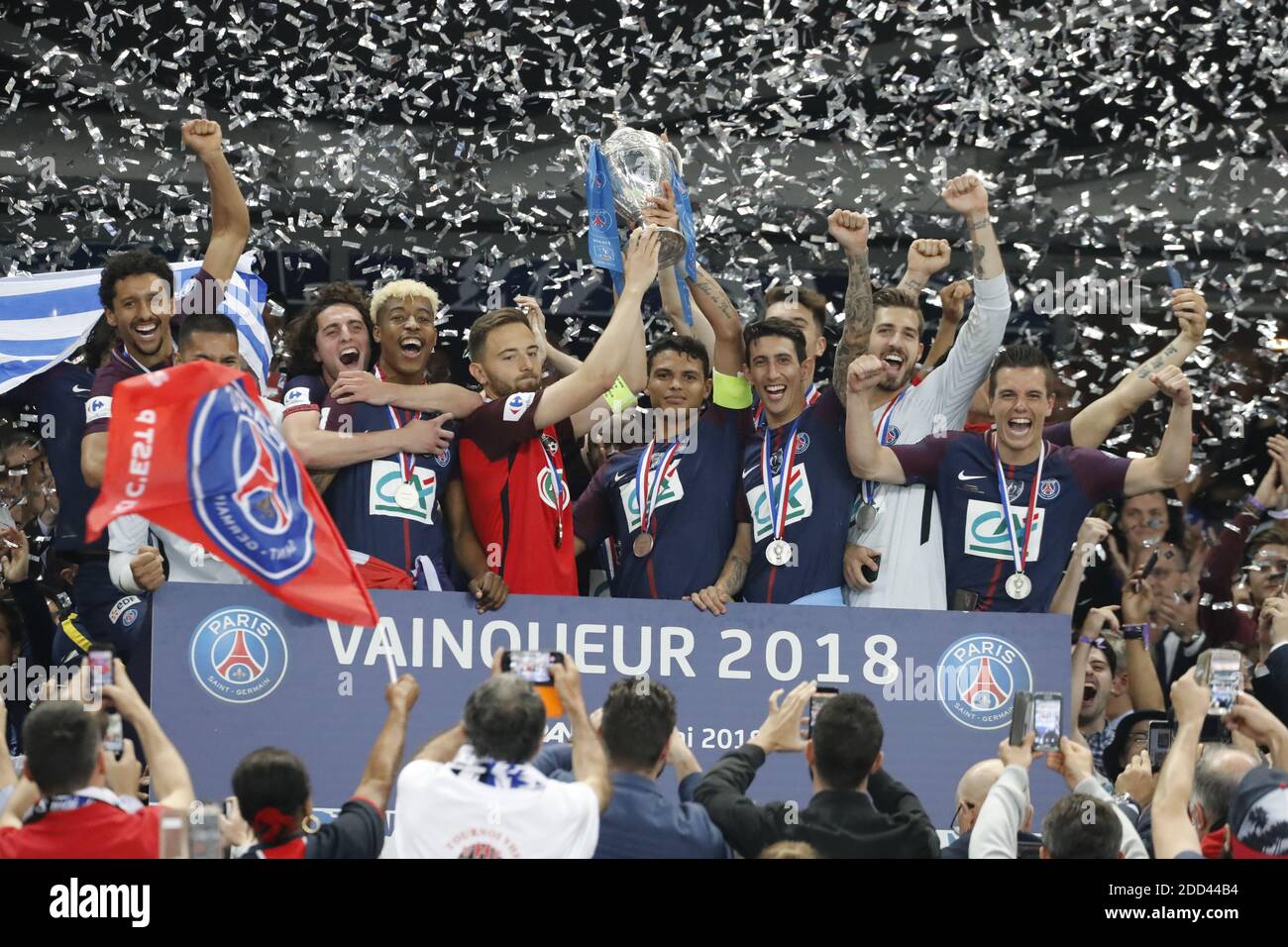 PSG's teammates celebrate with the trophy after winning the French Cup ...