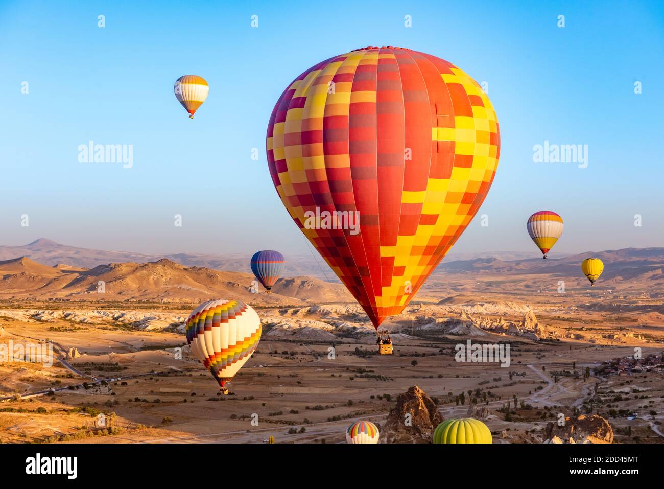 Hot air balloons flying in sunset sky Cappadocia, Goreme, Turkey Stock ...