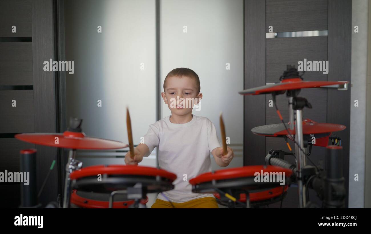 Teenager drumming hi-res stock photography and images - Alamy
