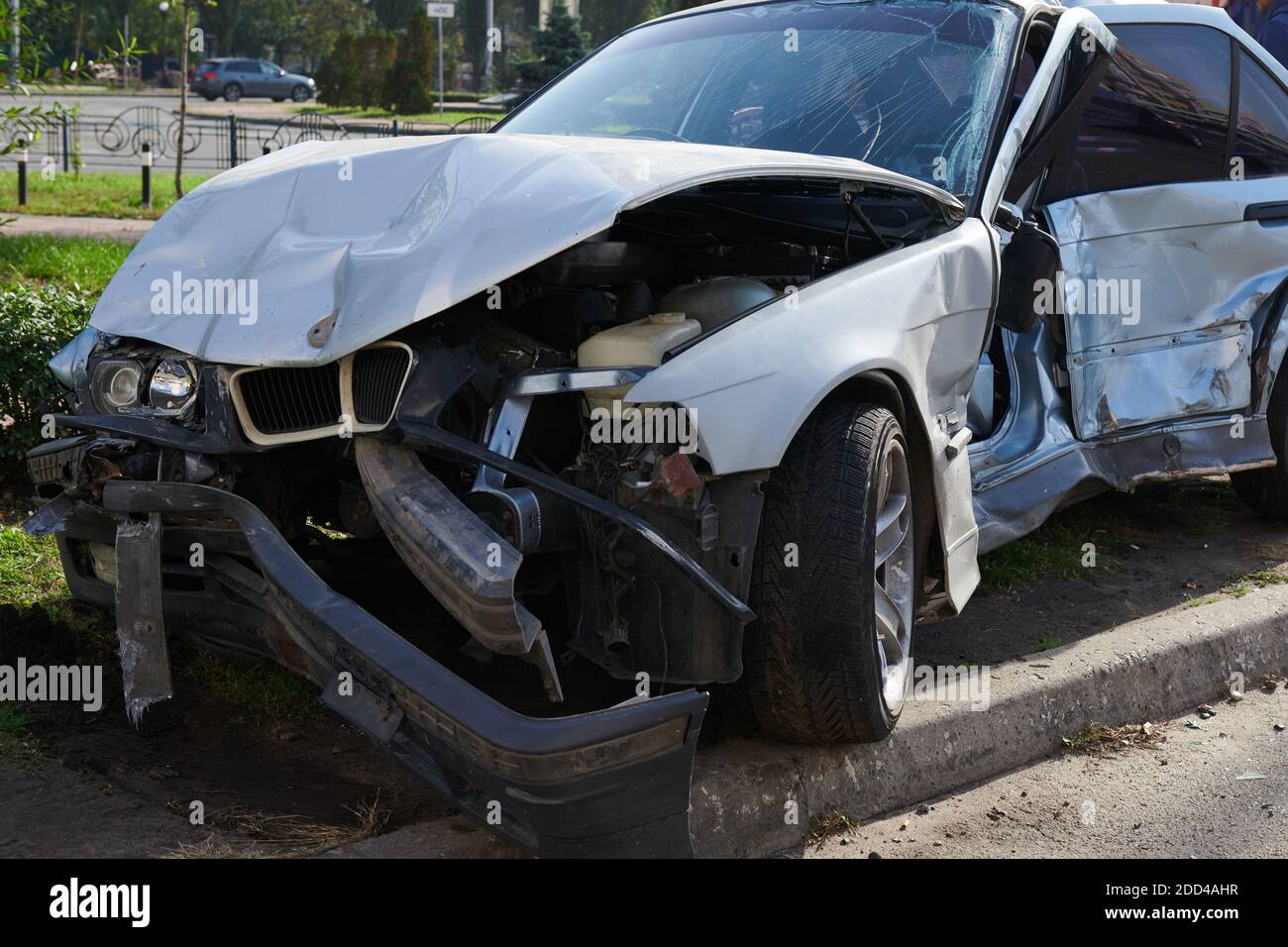 Silver car after a horrible crash accident. Front and side impact ...
