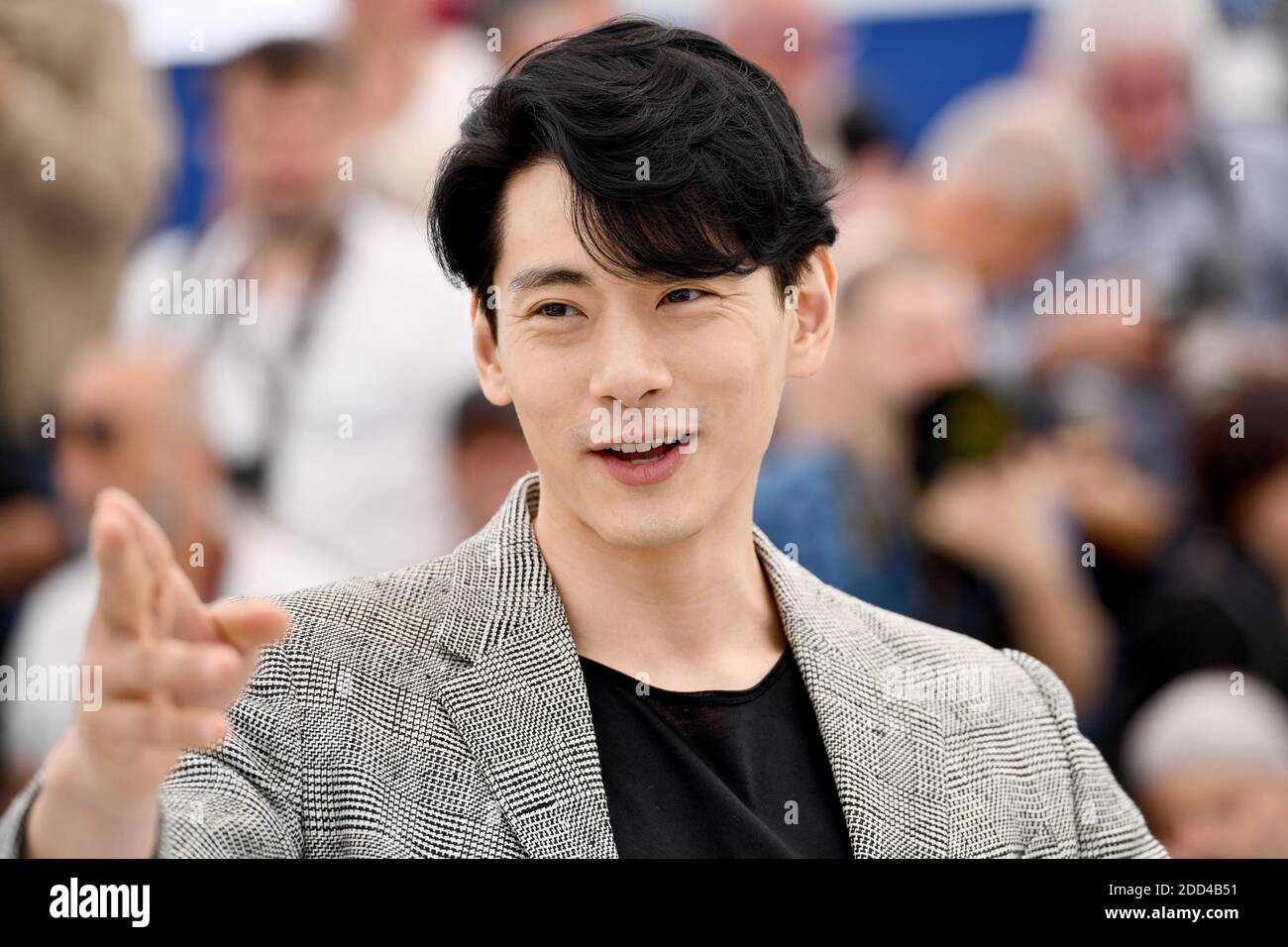 Teo Yoo posing at the Leto photocall held at the Palais des Festivals ...