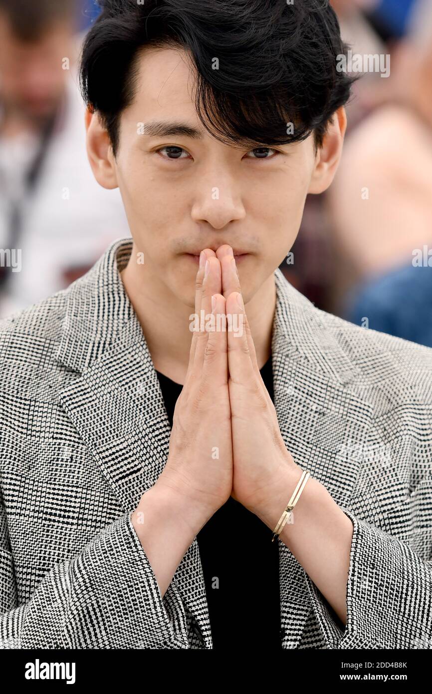 Teo Yoo posing at the Leto photocall held at the Palais des Festivals ...