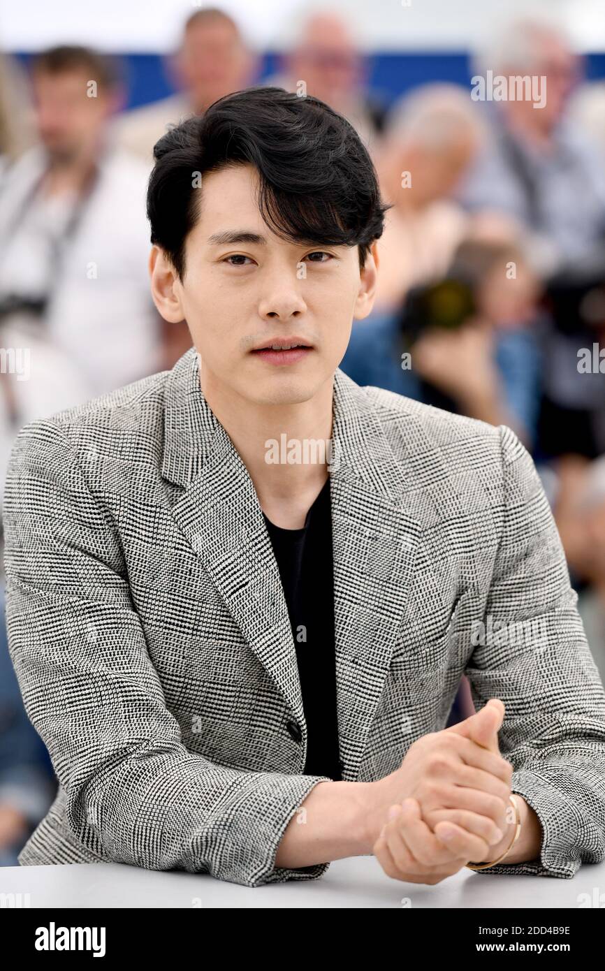 Teo Yoo posing at the Leto photocall held at the Palais des Festivals ...