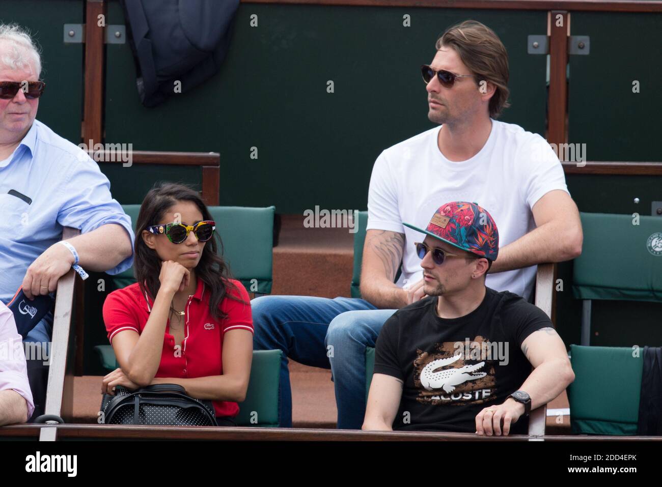 Hajiba Fahmy and Camille Lacourt in stands during French Tennis Open at ...