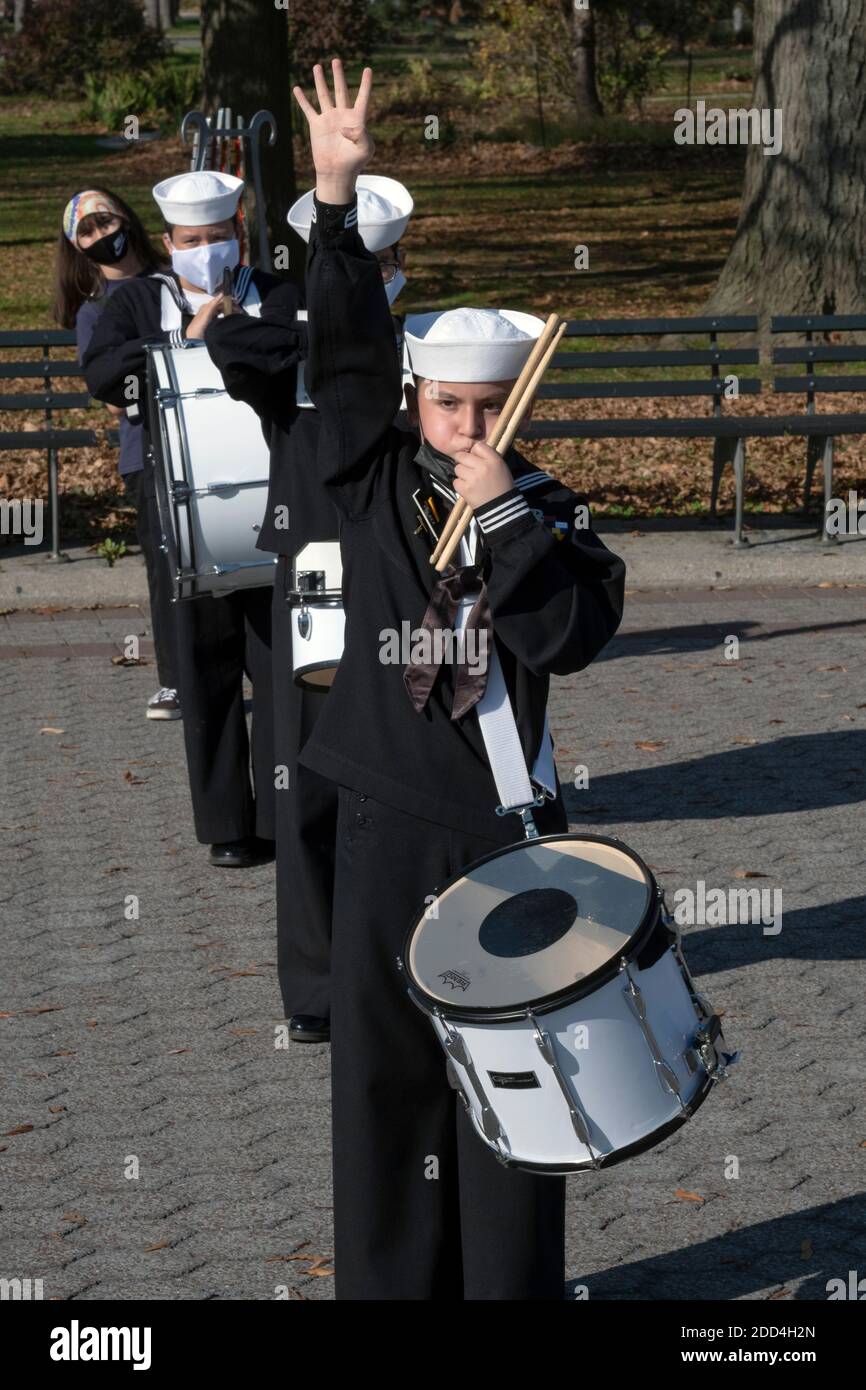 Teenagers in the US Naval Cadet Corps marching band rehearse near the ...