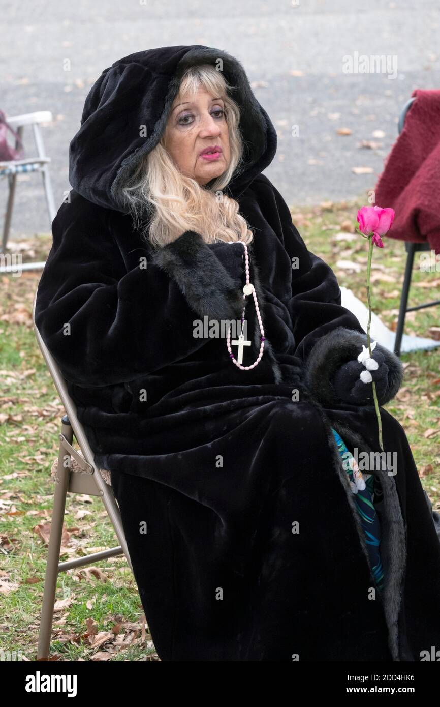 Devout Roman Catholic woman at a service the Vatican Pavilion site in ...