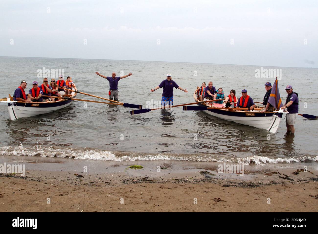 Troon Beach, Ayr, Ayrshire, Scotland. Members ot Troon Rowing Club in ...