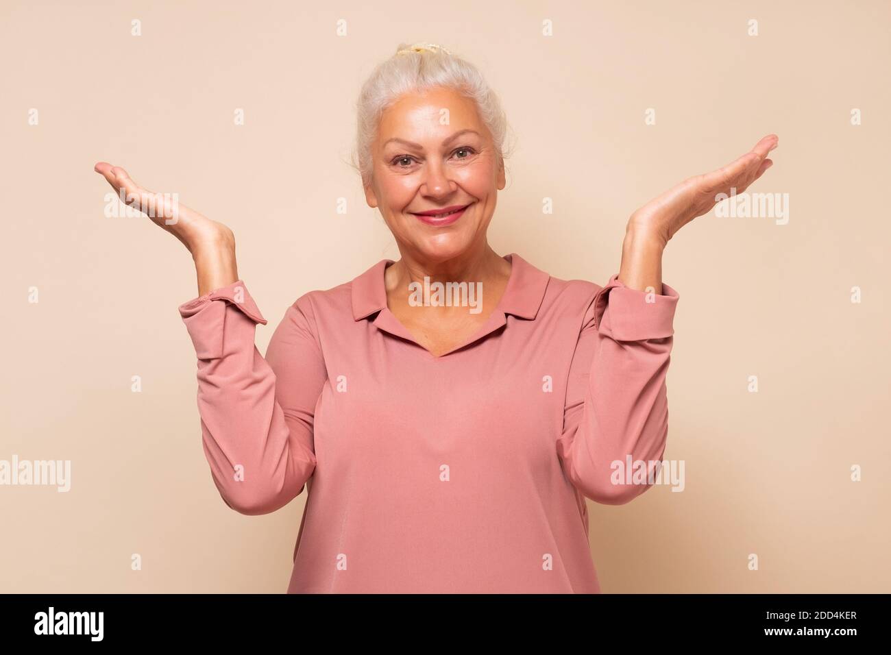 Woman presenting open palms hi-res stock photography and images - Alamy