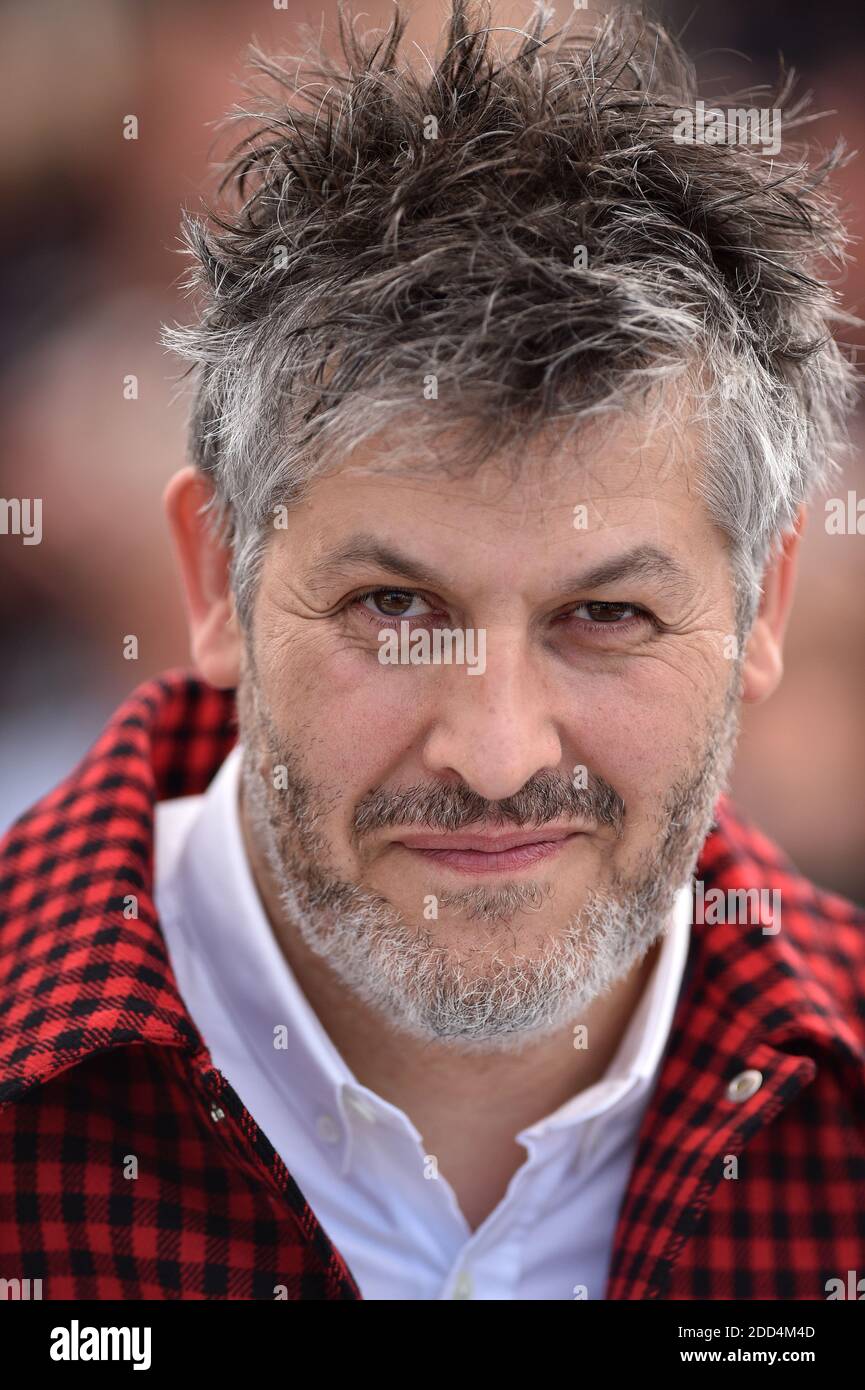 Christophe Honore posing at the Plaire, Aimer Et Courir Vite photocall ...