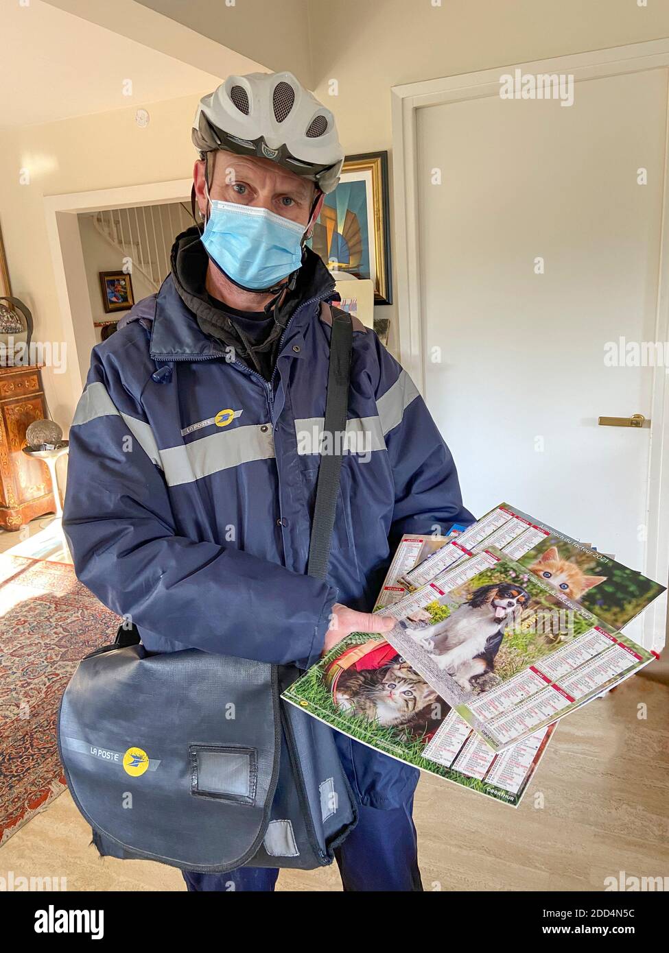 WANT A PARIS POSTMAN'S CALENDAR Stock Photo - Alamy