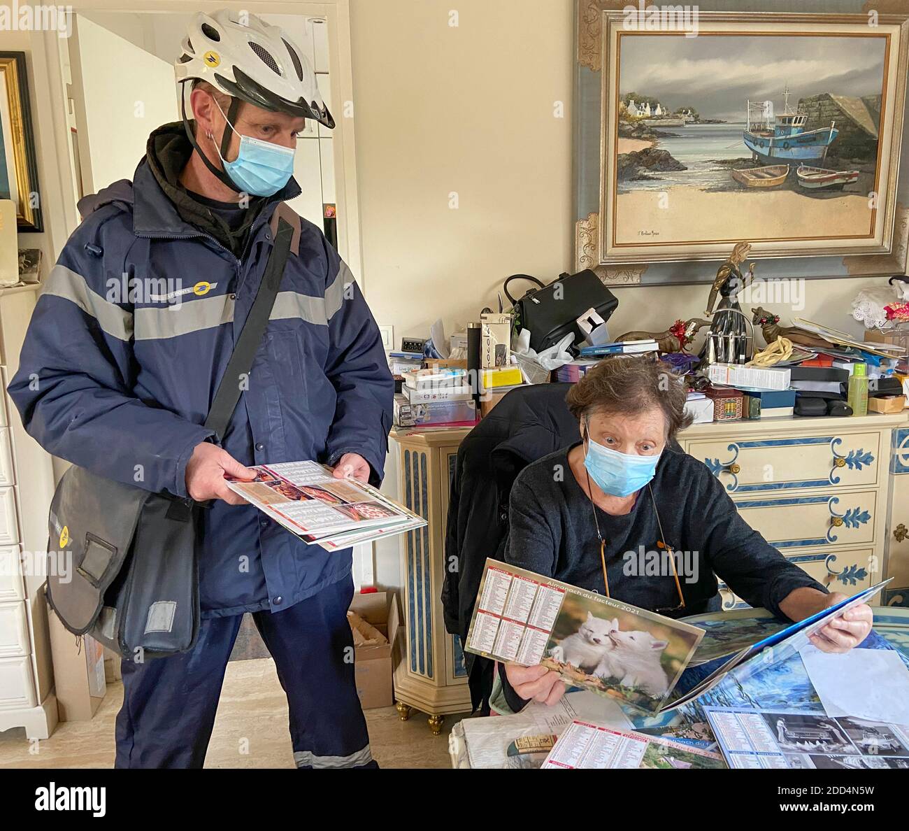 WANT A PARIS POSTMAN'S CALENDAR Stock Photo - Alamy