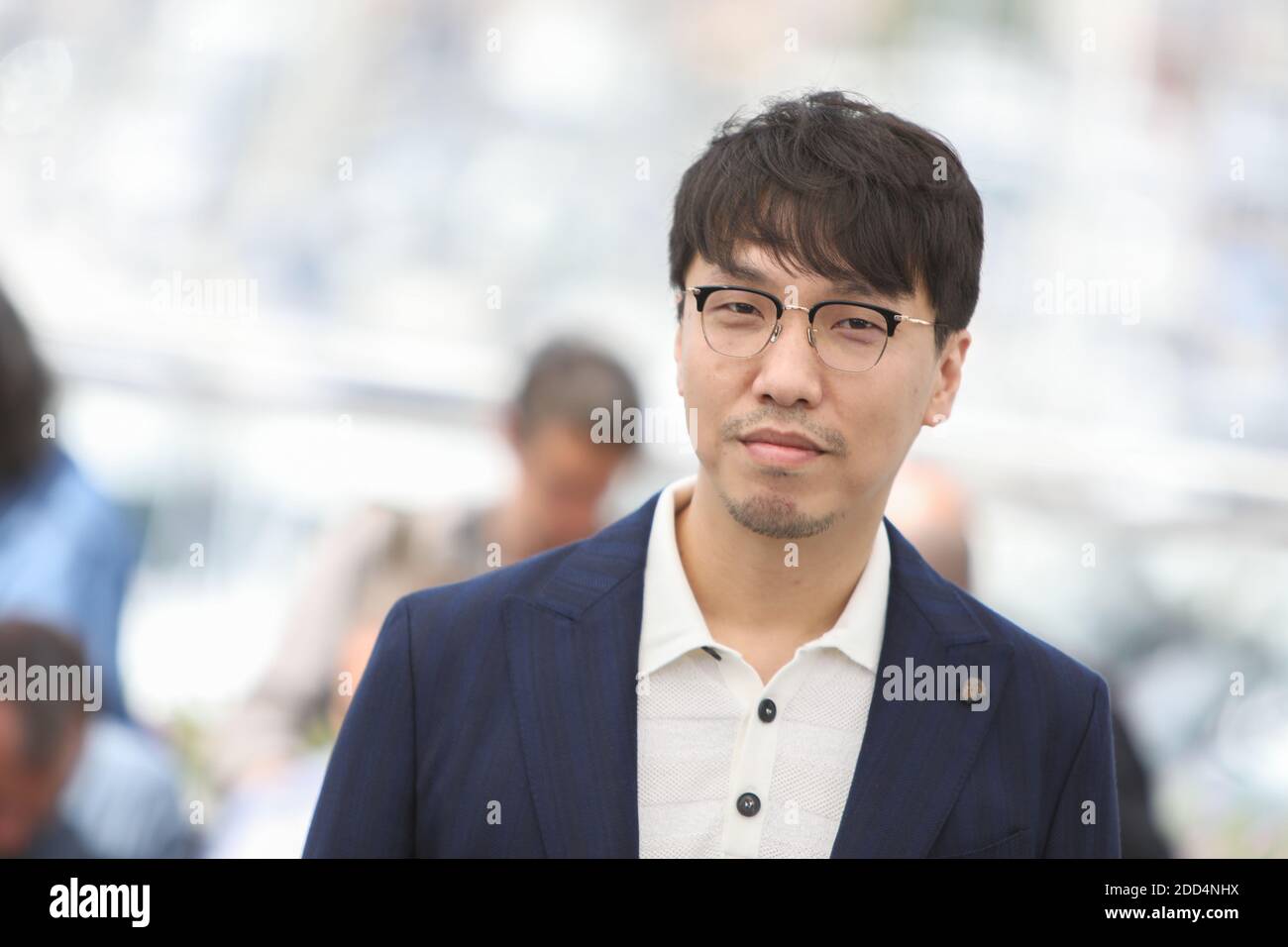 Director Jong-bin Yoon attends the photocall for 'The Spy Gone North ...